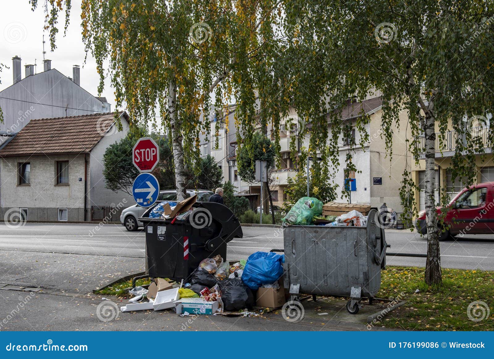 Candid Shot of Overflowing Garbage Bins Along the Road Stock Photo ...
