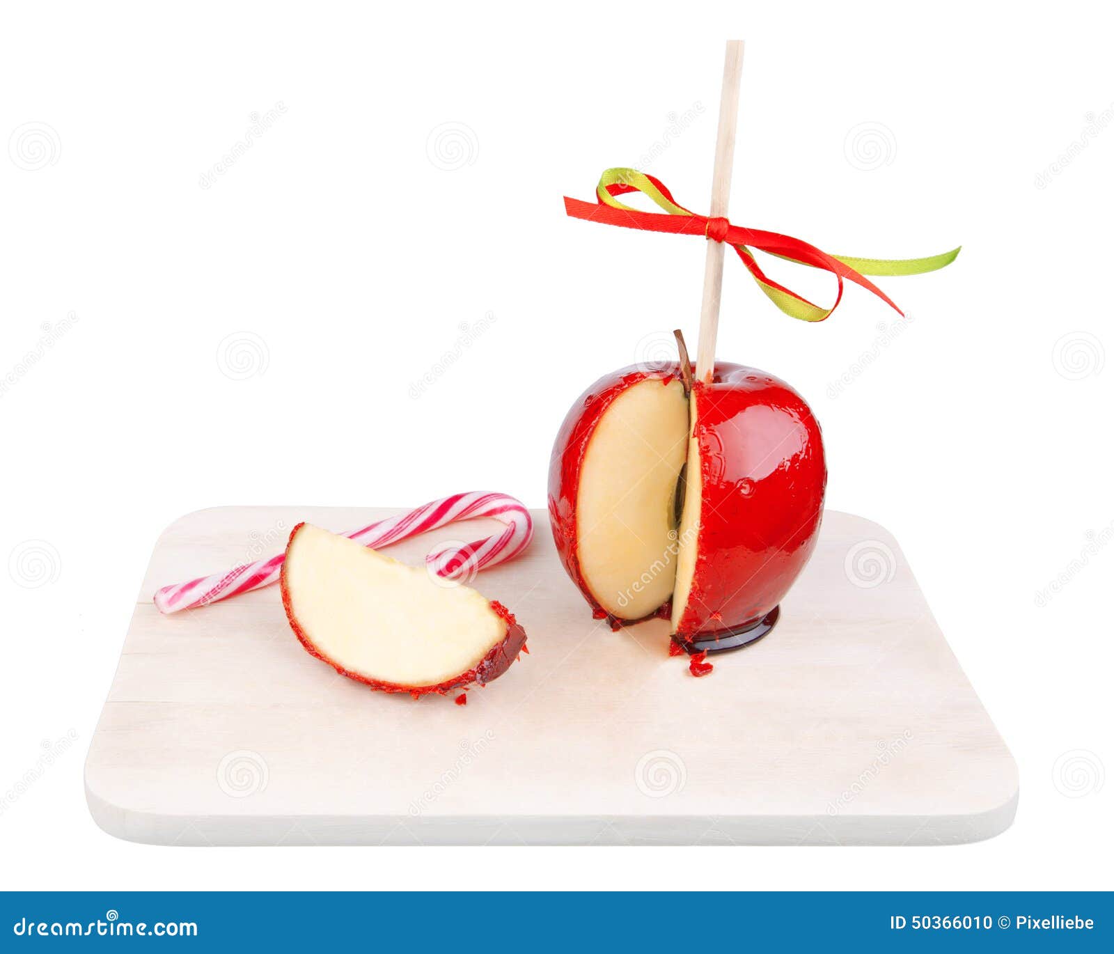 Candied Apple with a Candy Cane Stock Photo - Image of object ...