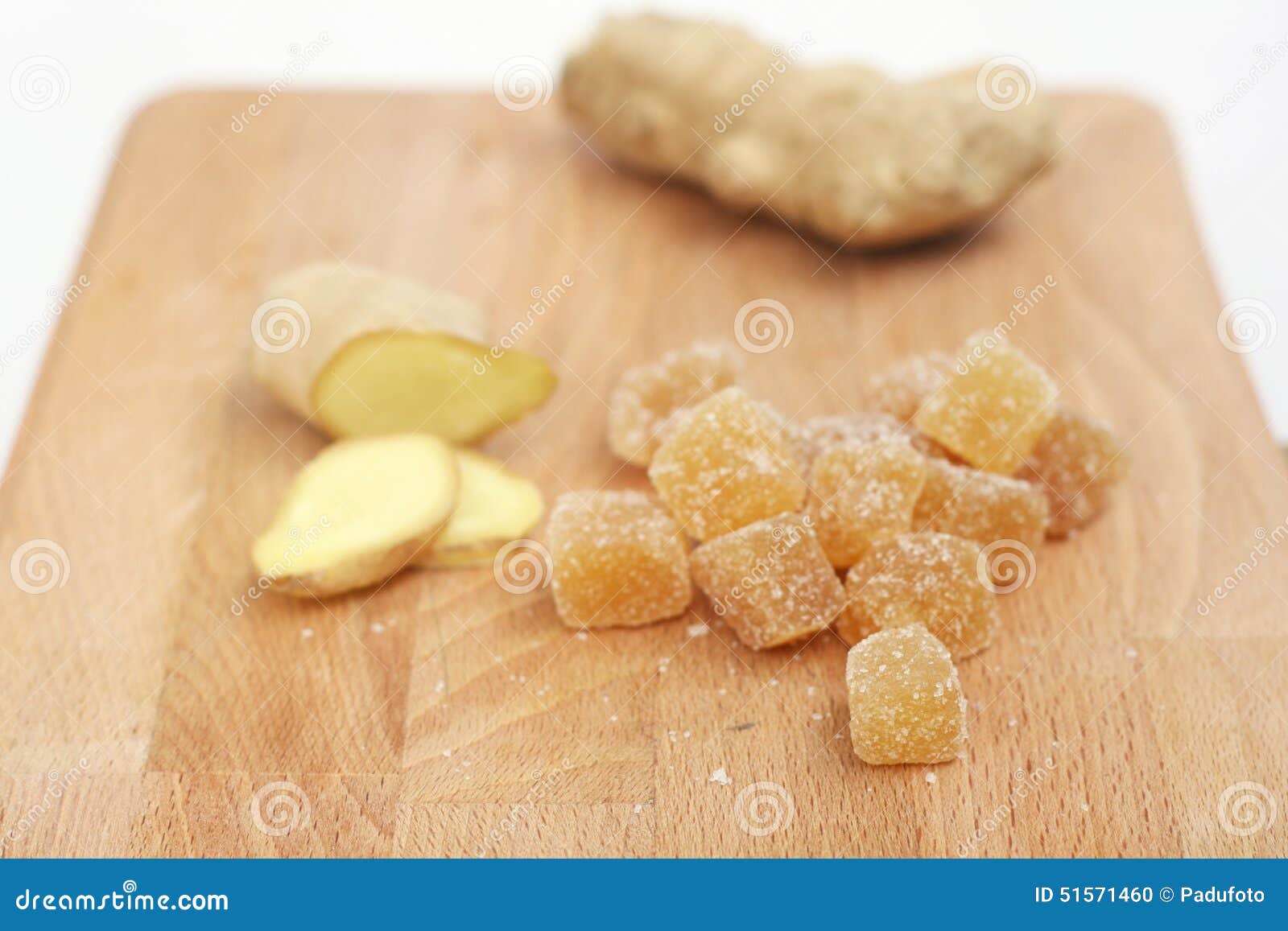 Candied ginger cubes stock photo. Image of energy, wooden - 51571460