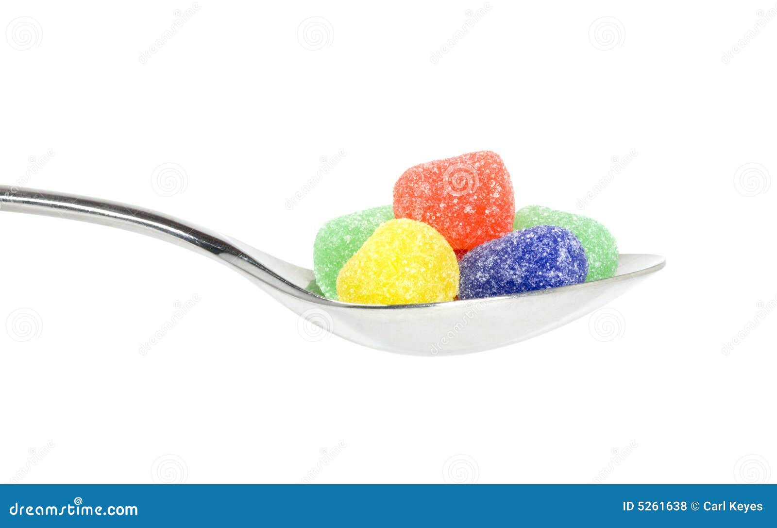 Candies in a Spoon stock photo. Image of silverware, spoon - 5261638