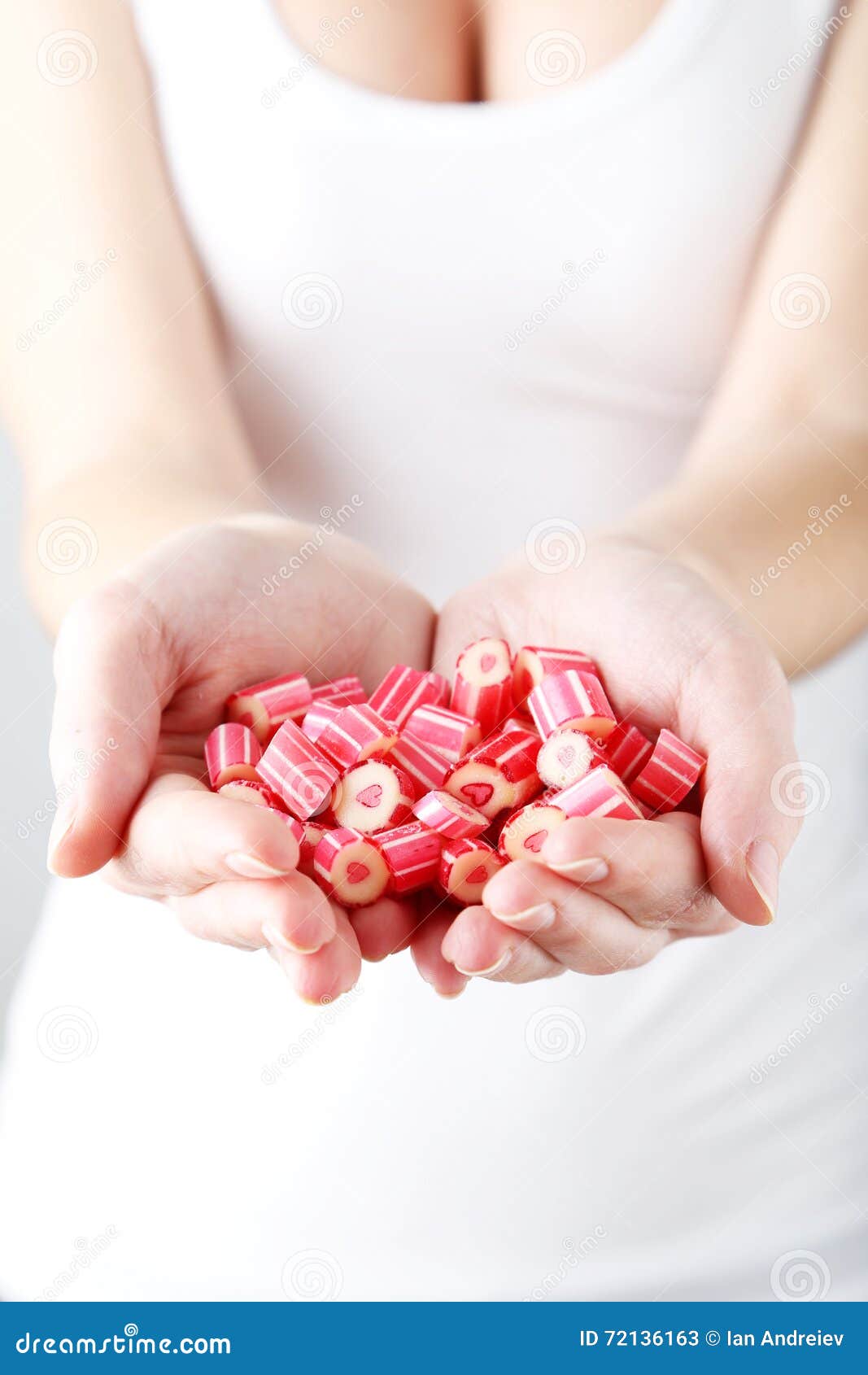 Candies stock image. Image of hold, hands, texture, lollipops - 72136163