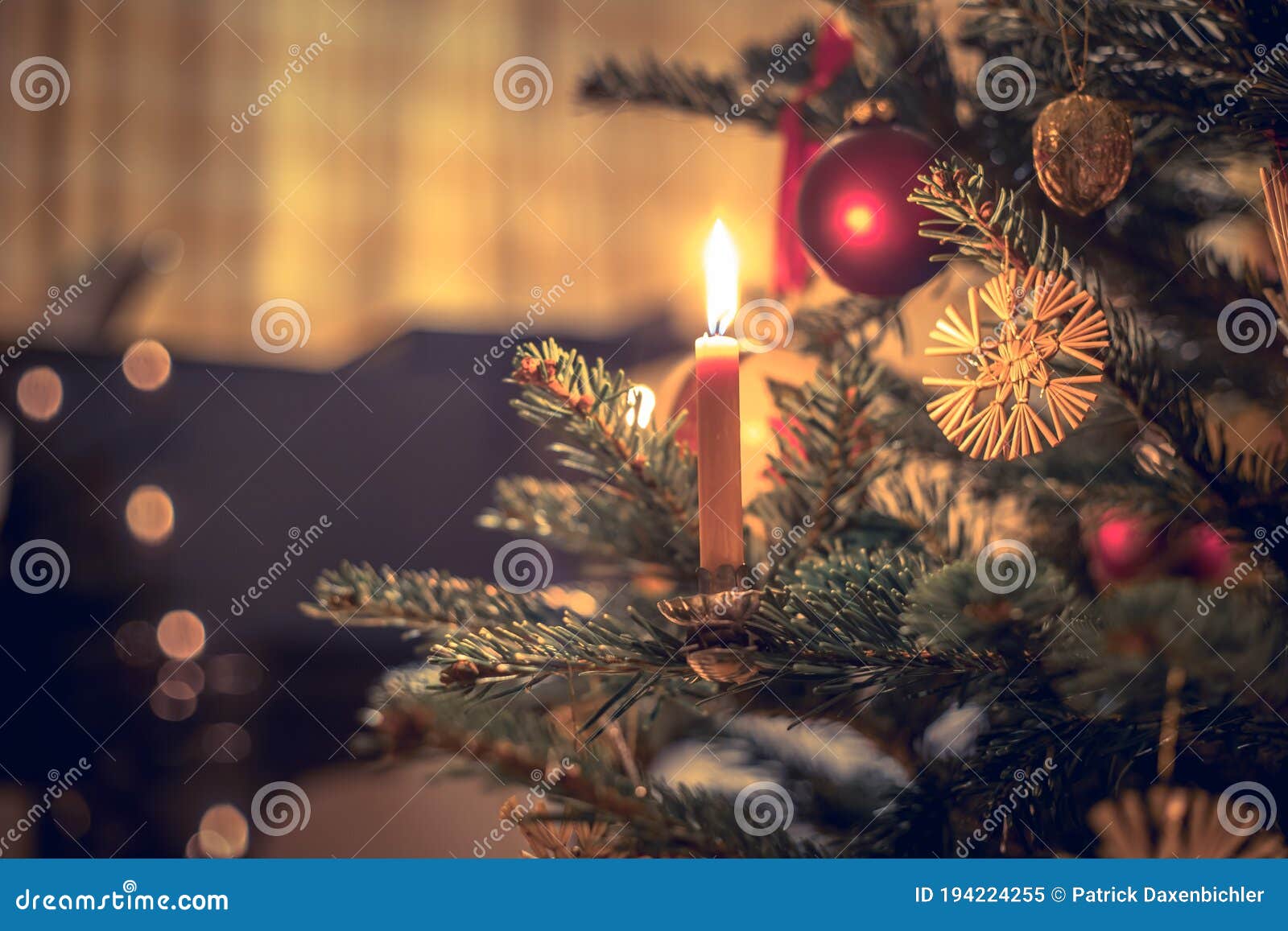 Candle on Traditional Decorated Christmas Tree, Evening Stock Image ...
