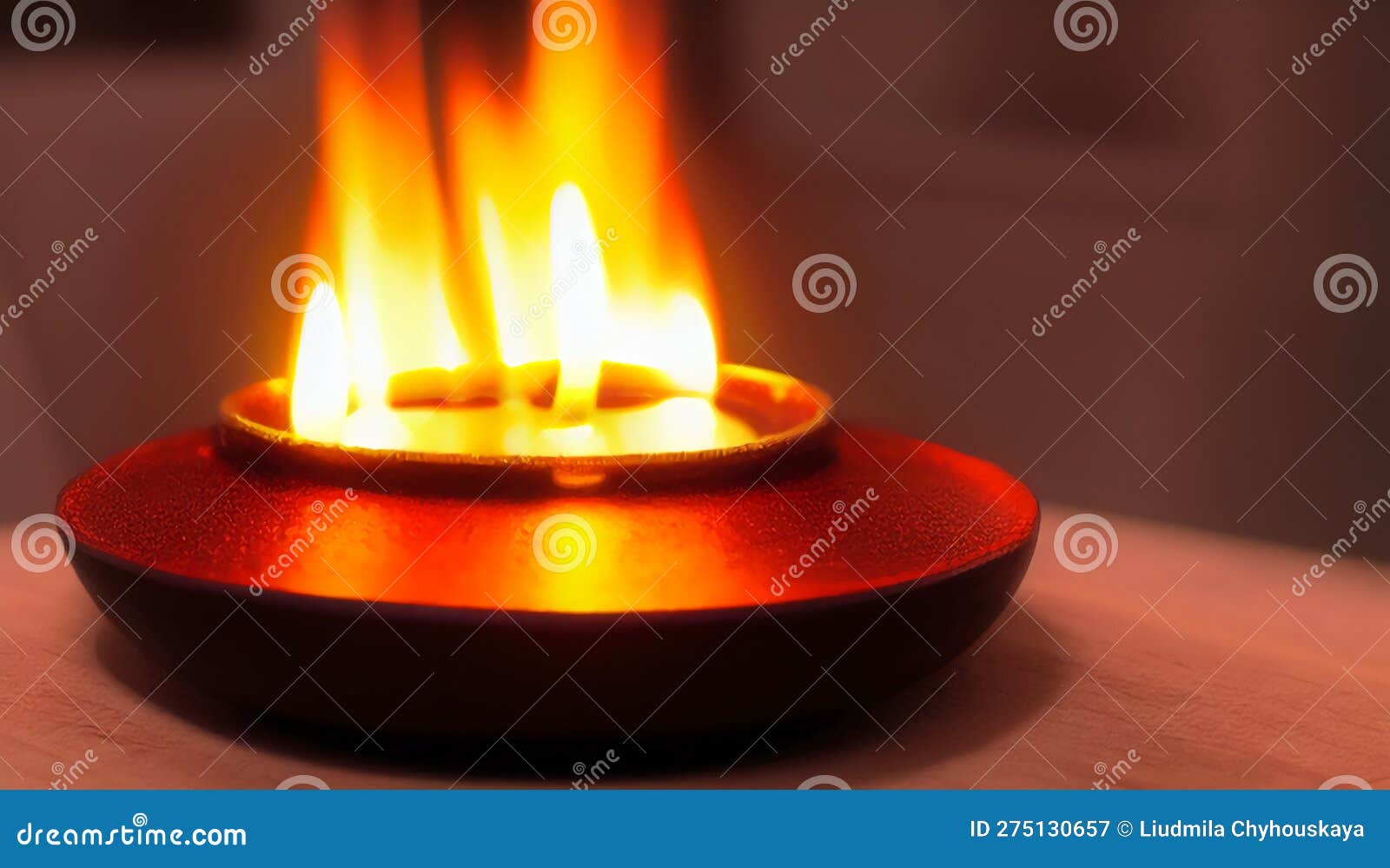 A Candle with Burning Wicks on the Table in a Romantic Setting. a ...