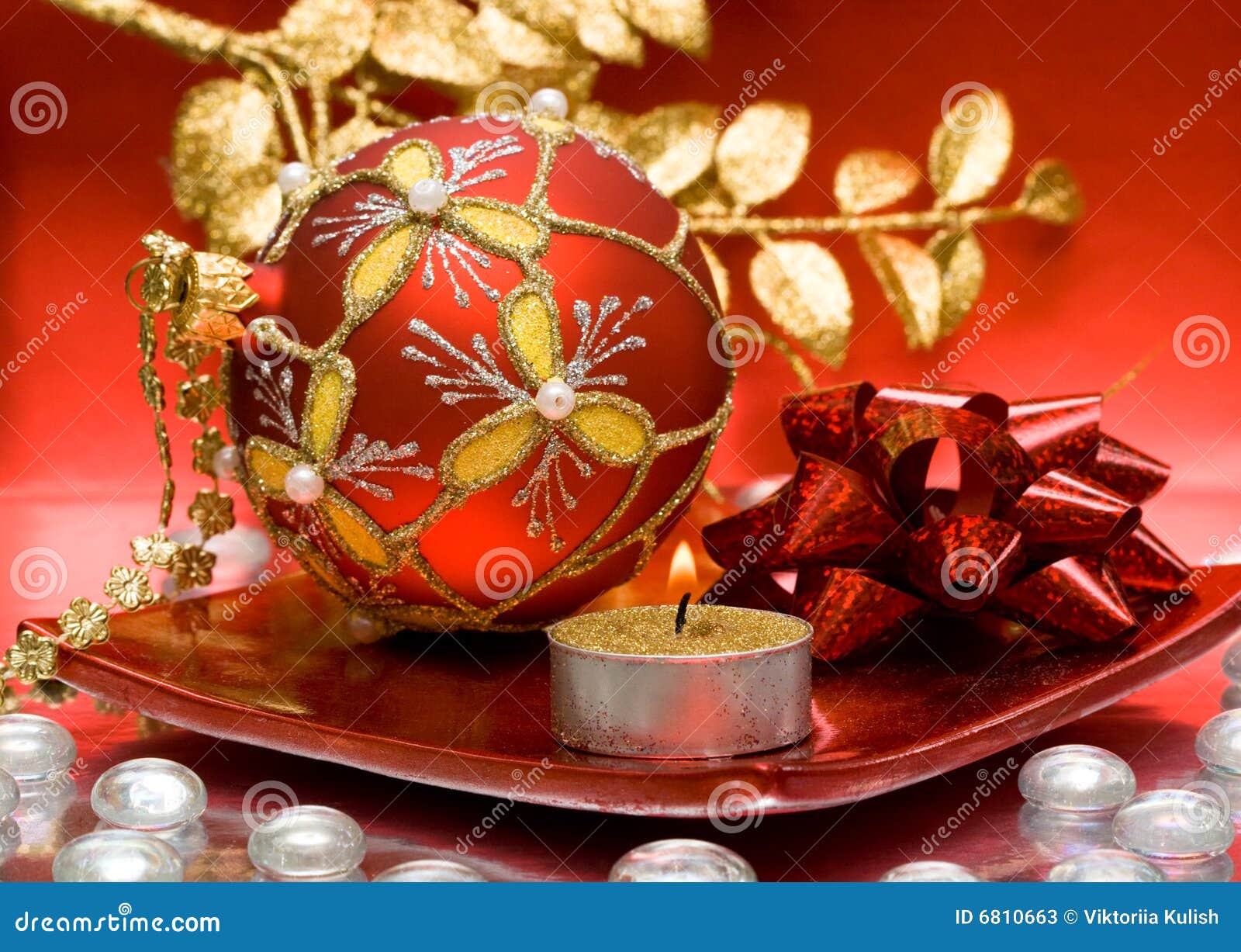 Candle with Christmas ball stock image. Image of leaf - 6810663