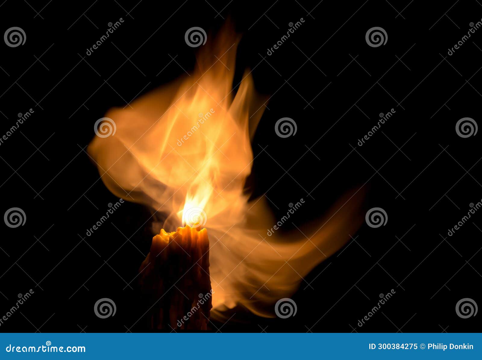 Candle Flame with Exploding Flammable Liquid Sprayed Onto Flame ...