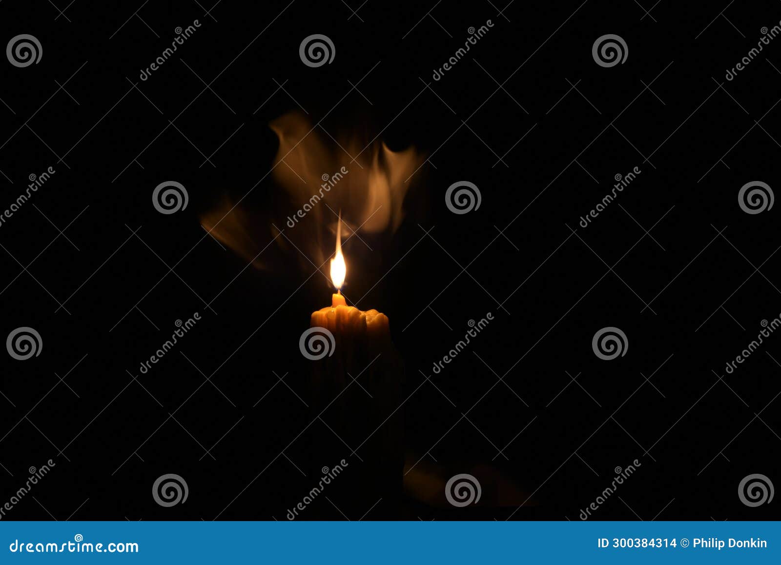 Candle Flame with Exploding Flammable Liquid Sprayed Onto Flame ...