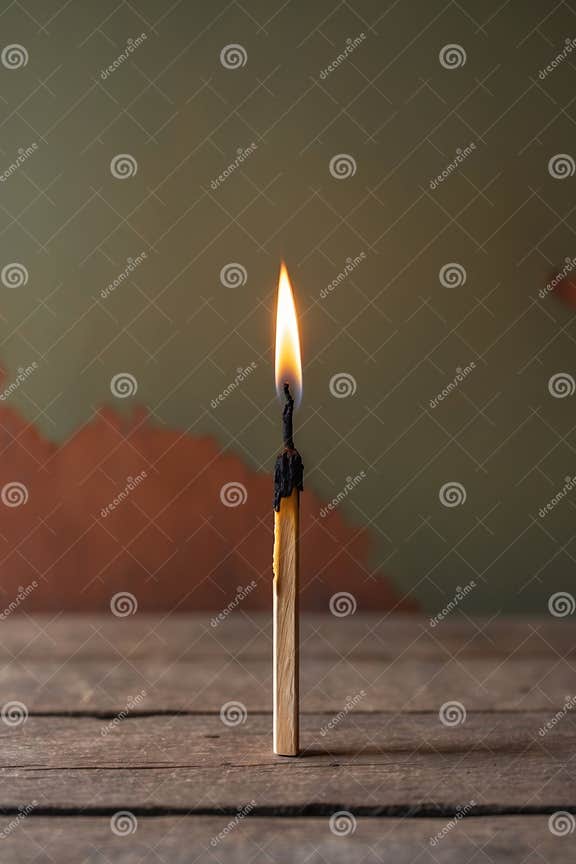 Candle Flame and Matchstick on Rustic Surface. Stock Image - Image of ...