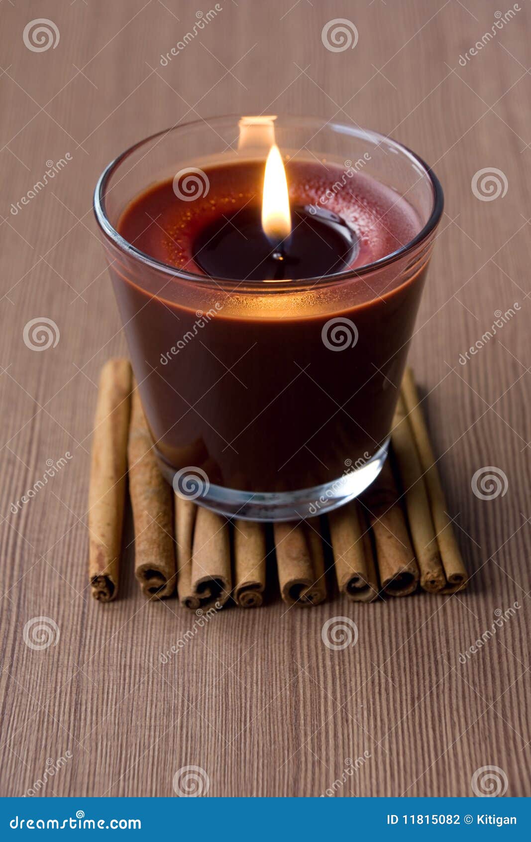Candle in the Glass and Cinnamon Stock Photo - Image of celebration ...
