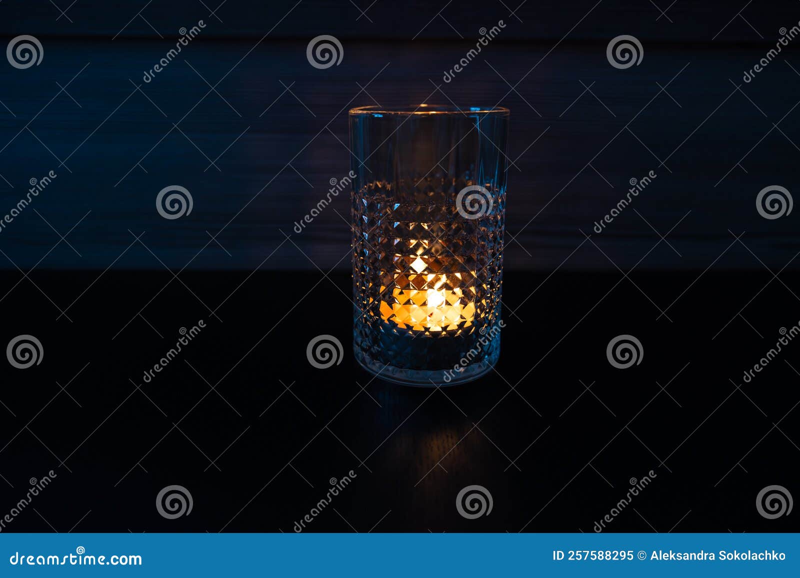 Candle in a Glass. Rays of Light are Refracted through the Walls of the ...