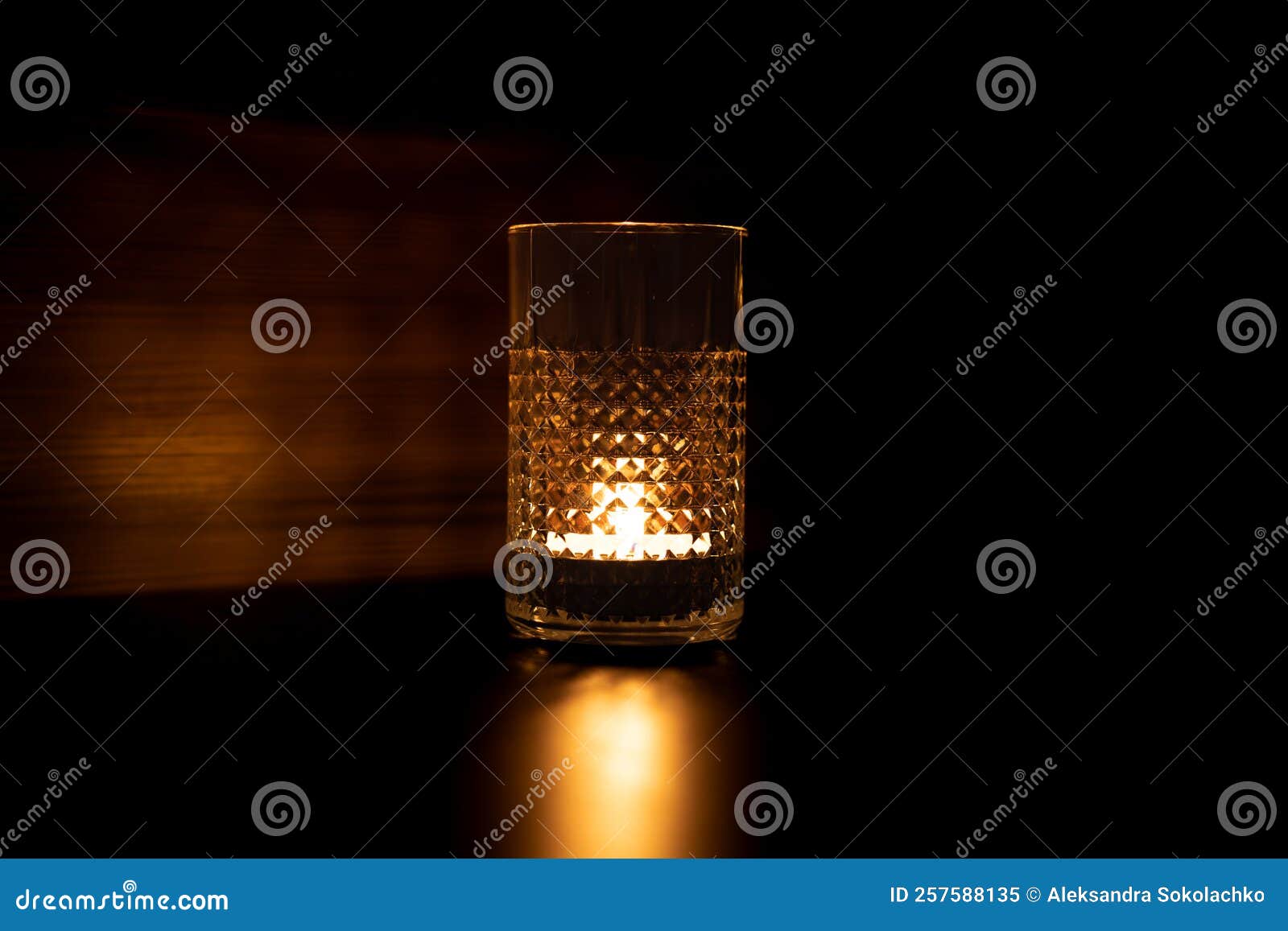 Candle in a Glass. Rays of Light are Refracted through the Walls of the ...