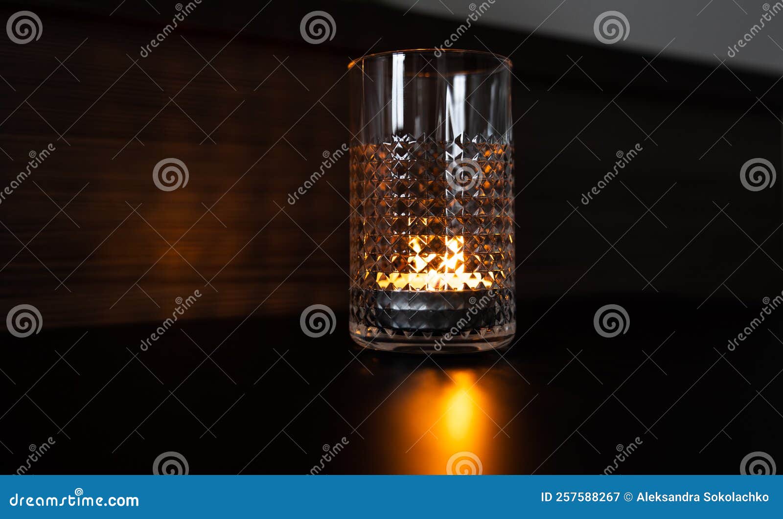 Candle in a Glass. Rays of Light are Refracted through the Walls of the ...
