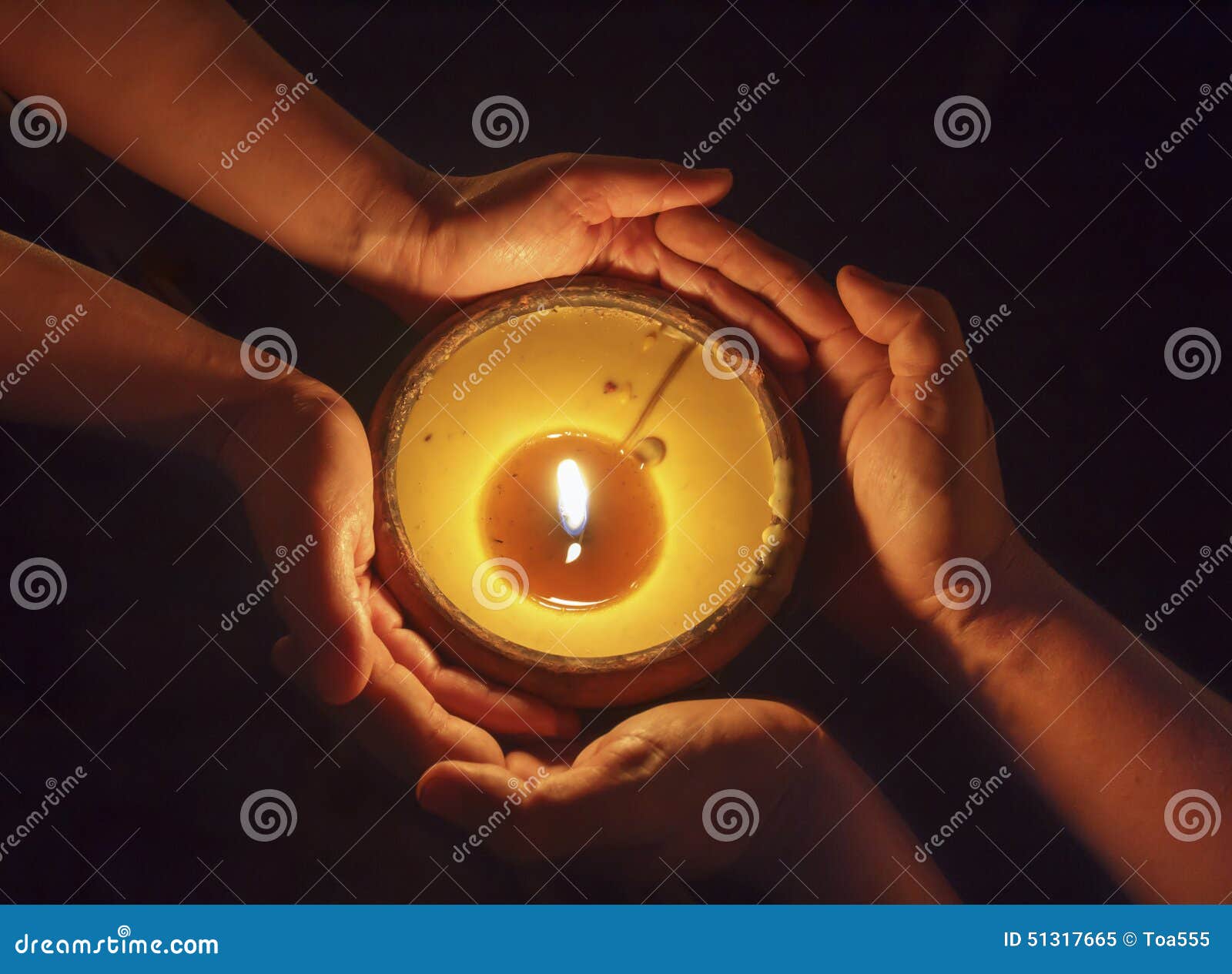 Candle in the hands stock image. Image of holiday, ball - 51317665