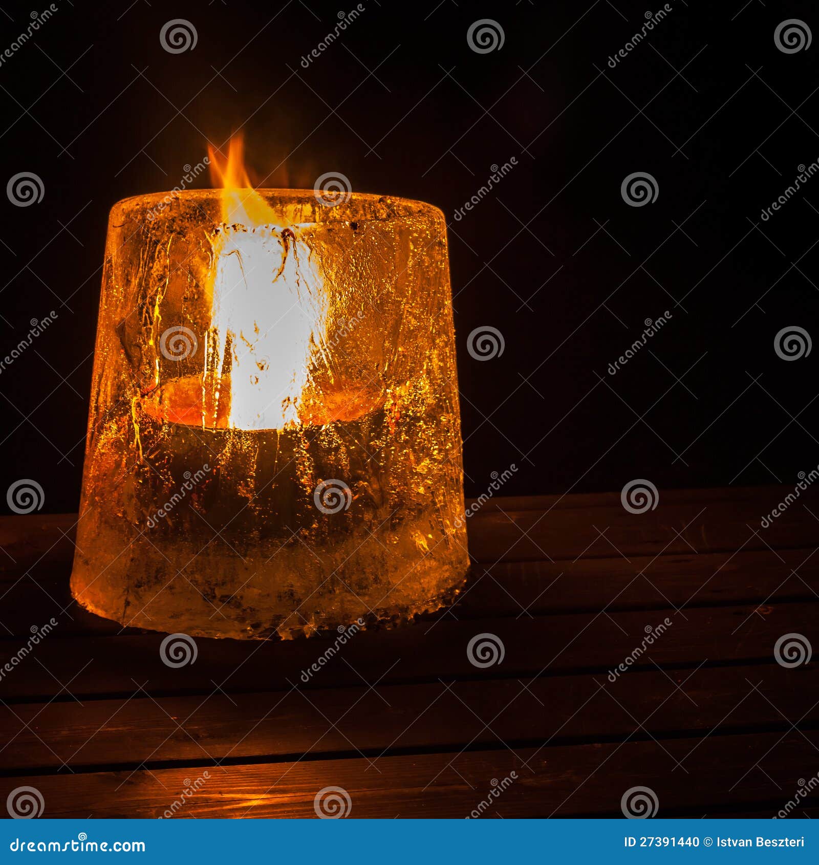 Candle in Ice stock photo. Image of heat, wood, cold - 27391440