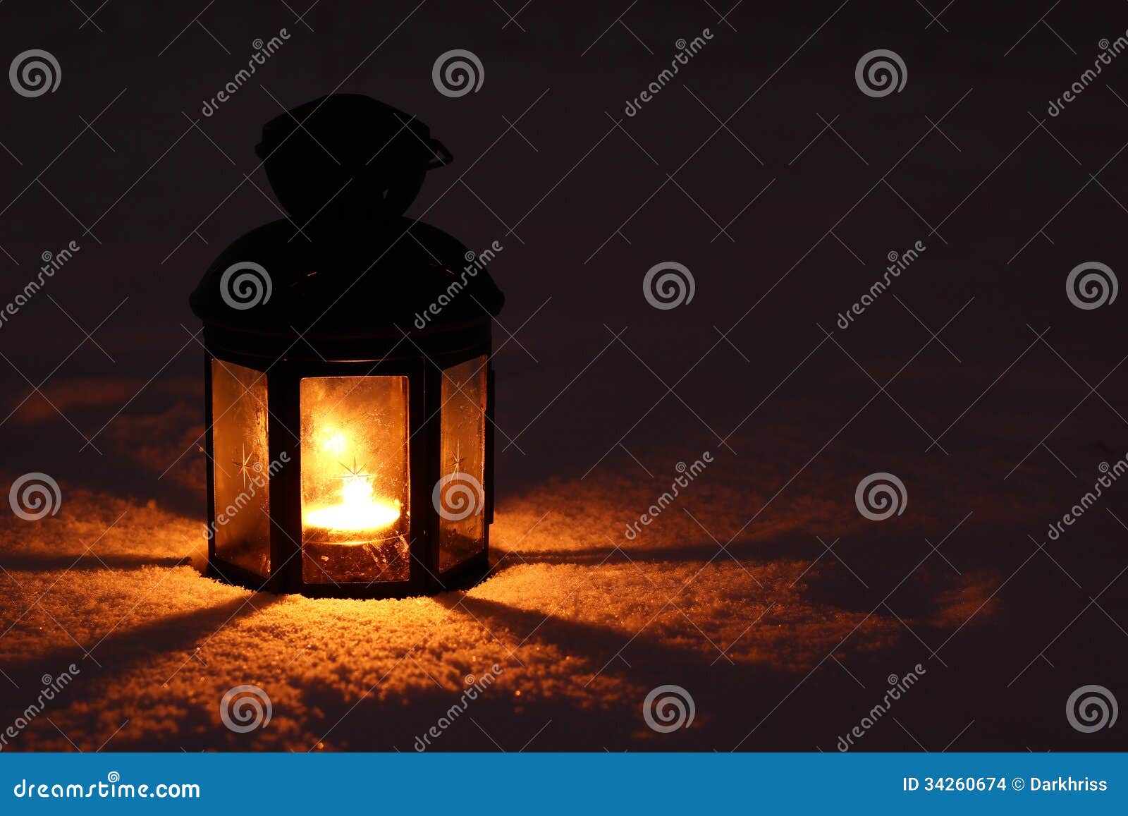Candle lamp in snow stock photo. Image of celebration - 34260674