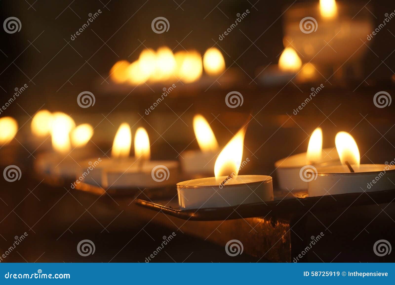 Candle light in cathedral stock image. Image of peace - 58725919