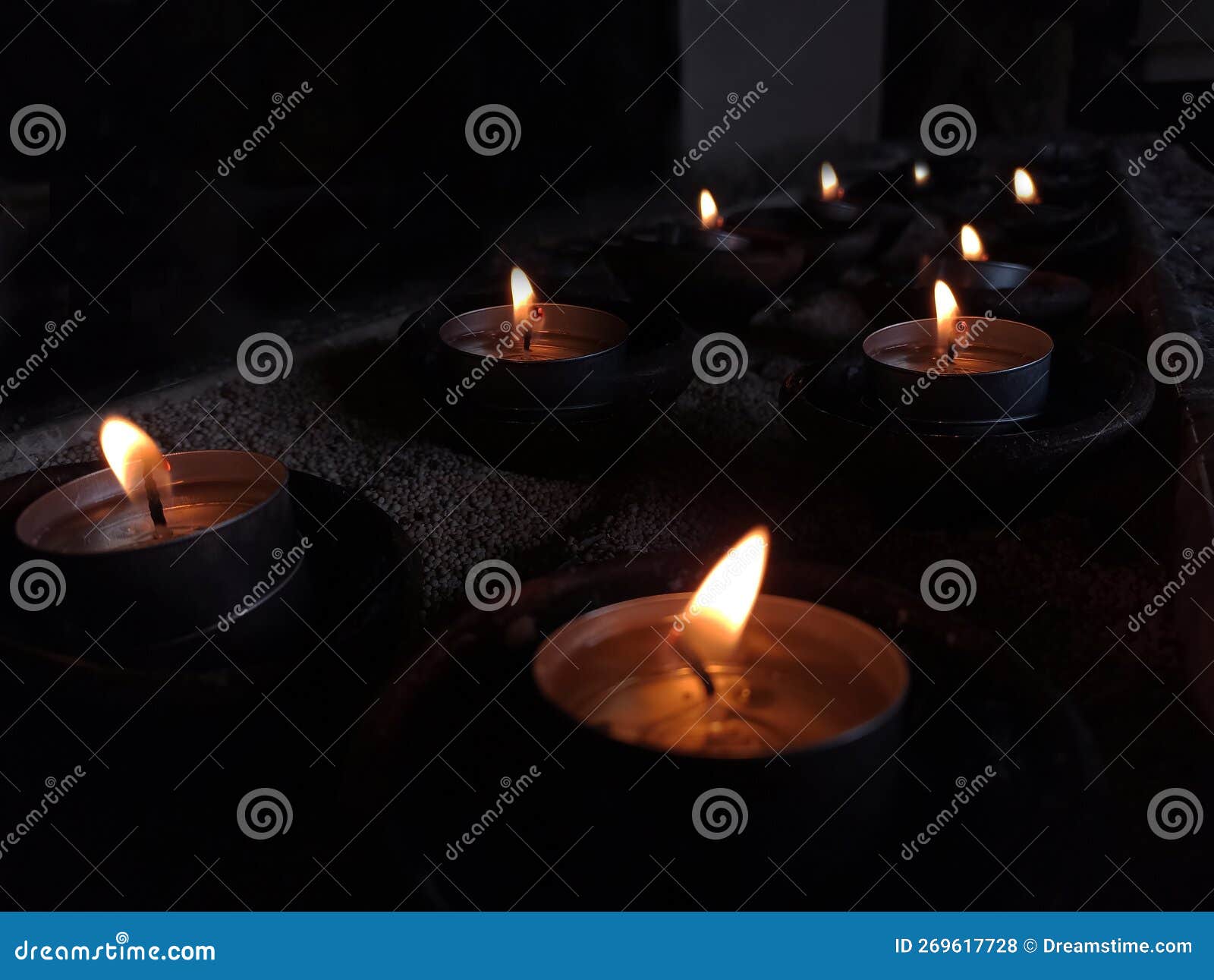 Candle Lights in the Night on Dark Background. Light of Candles ...