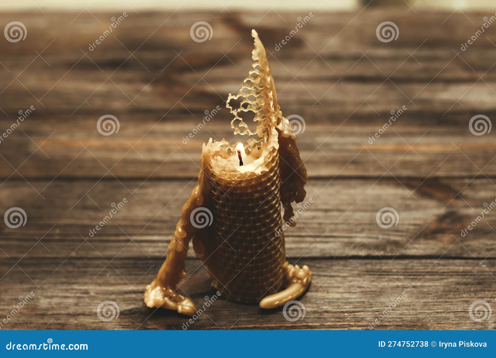 A Candle Made of Natural Wax is Half Burnt. Stock Photo - Image of ...