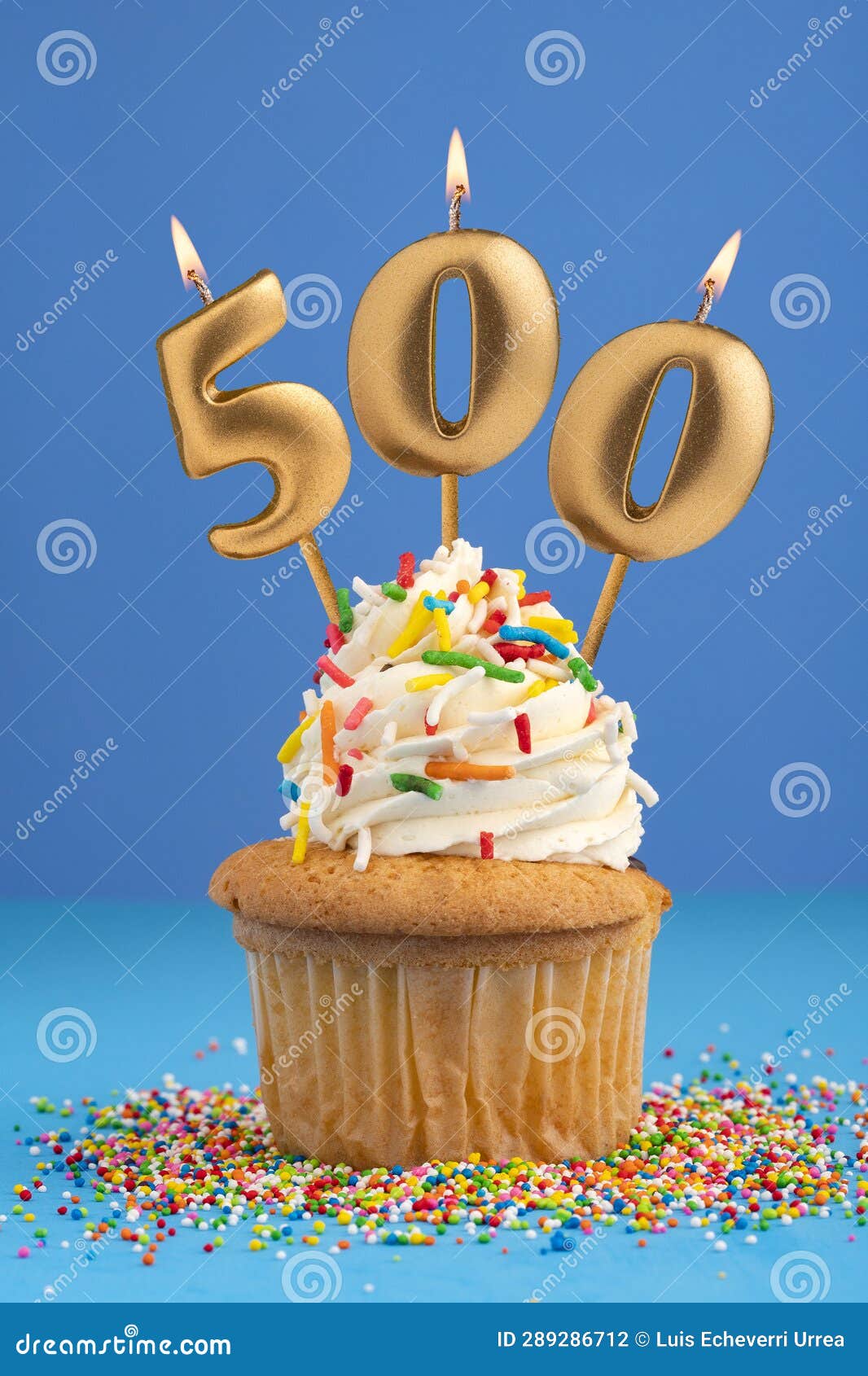 Candle Number 500 - Anniversary Cupcake on Blue Background Stock Photo ...