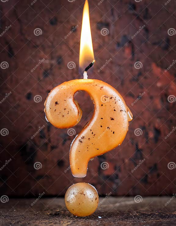 Candle in Shape of Question Mark with Flame. Dark Backdrop Stock ...