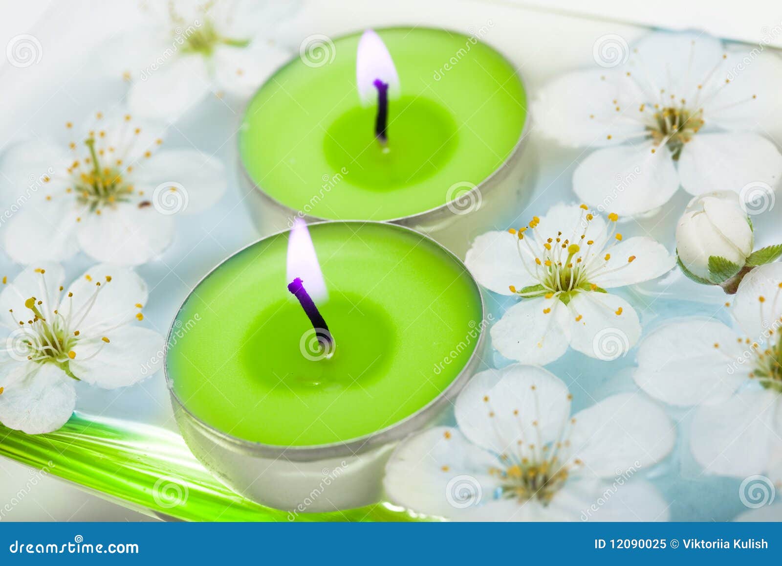 Candle with spring flowers stock image. Image of candle - 12090025