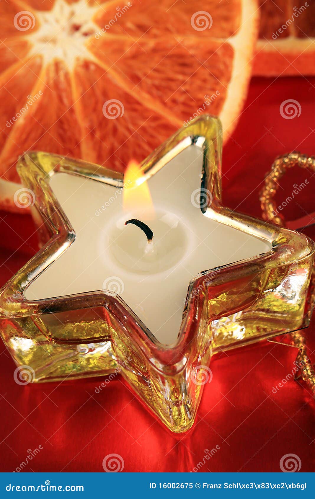 Candle in Star Shaped Holder Stock Image - Image of cross, material ...