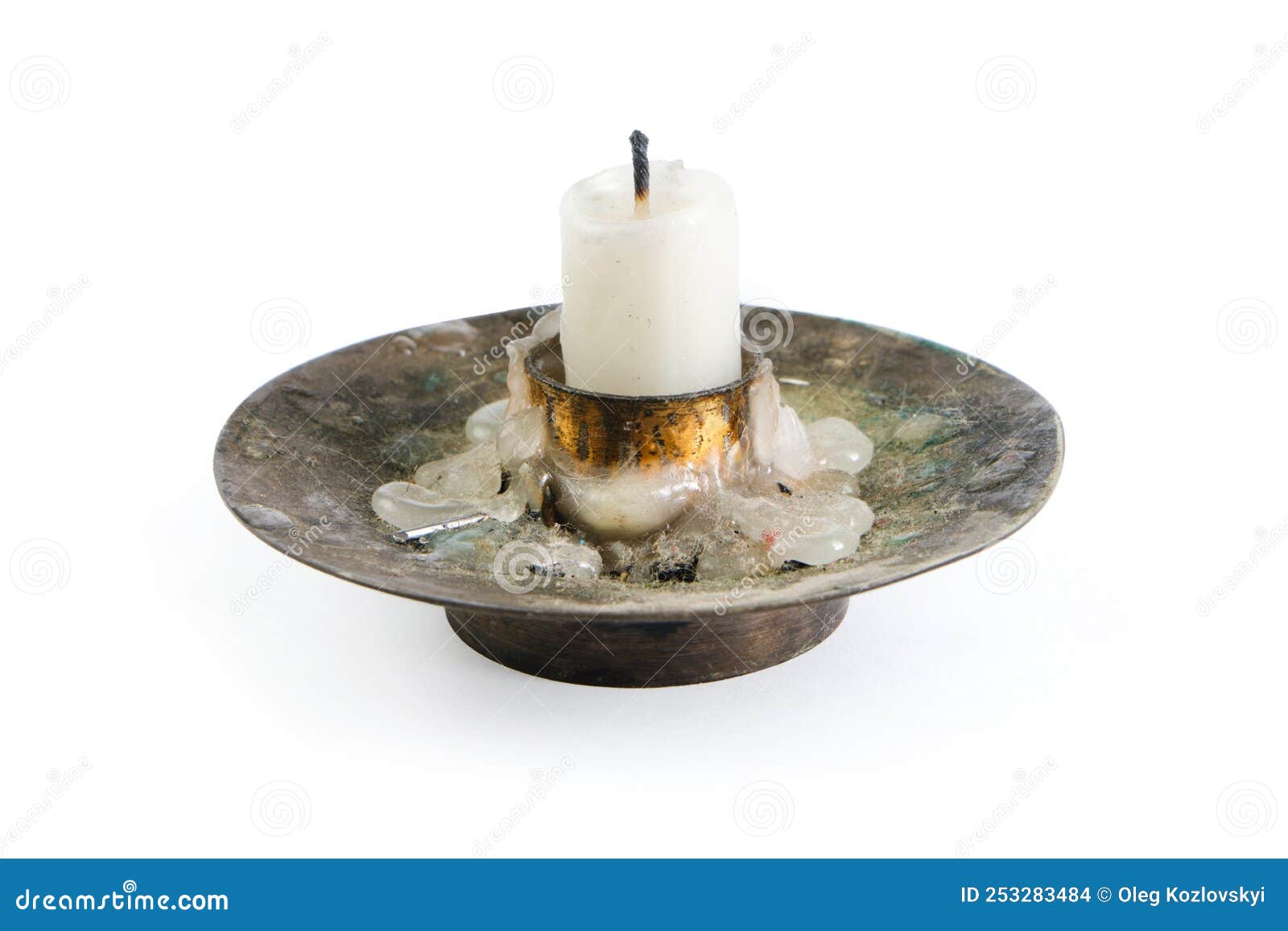 A Candle Stub in a Small, Dirty Old Candelabra Stock Photo - Image of ...