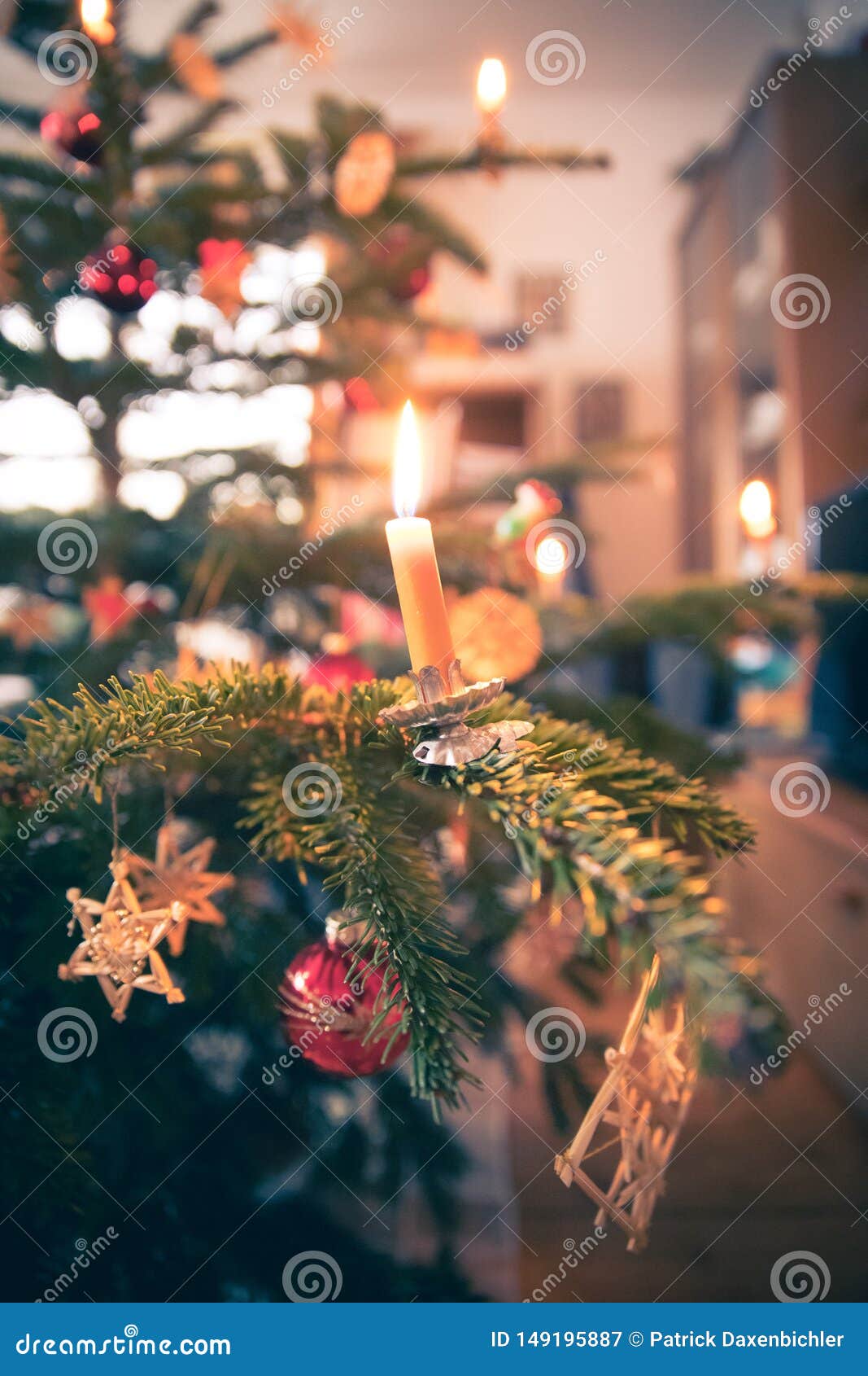 Candle on Traditional Decorated Christmas Tree, Evening Stock Image ...