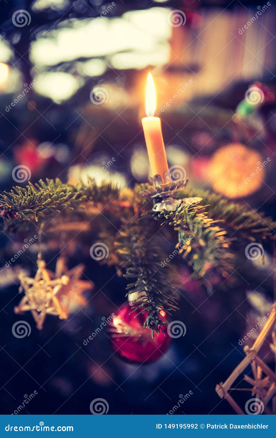 Candle on Traditional Decorated Christmas Tree, Evening Stock Photo ...