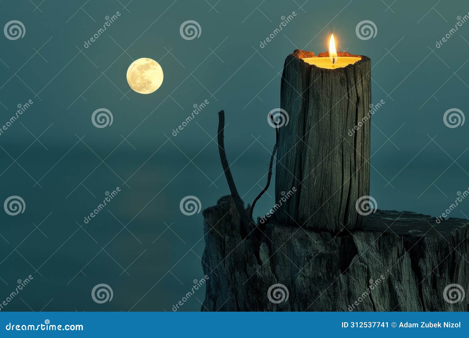 Candle on a Tree Stump with Full Moon in Background at Night Stock ...