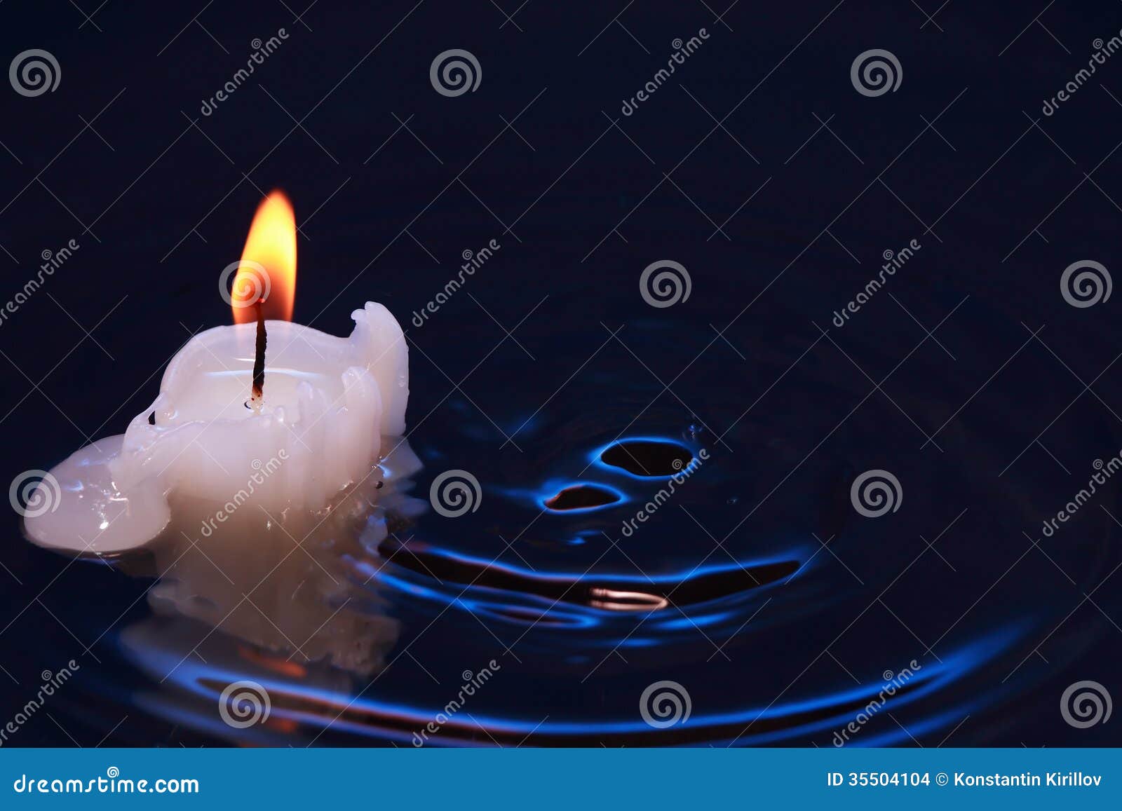 Candle in Water stock photo. Image of warm, still, lighting - 35504104
