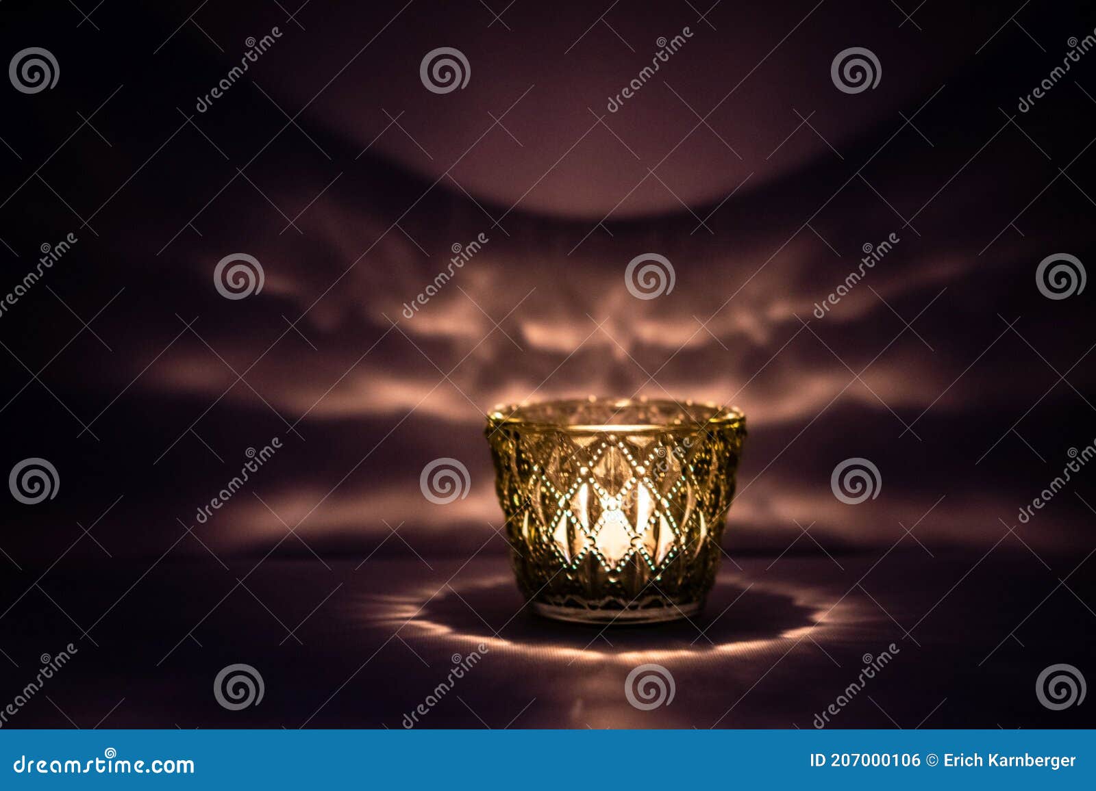 Candlelight in a Crystal Glass with Light Effect Stock Photo - Image of ...