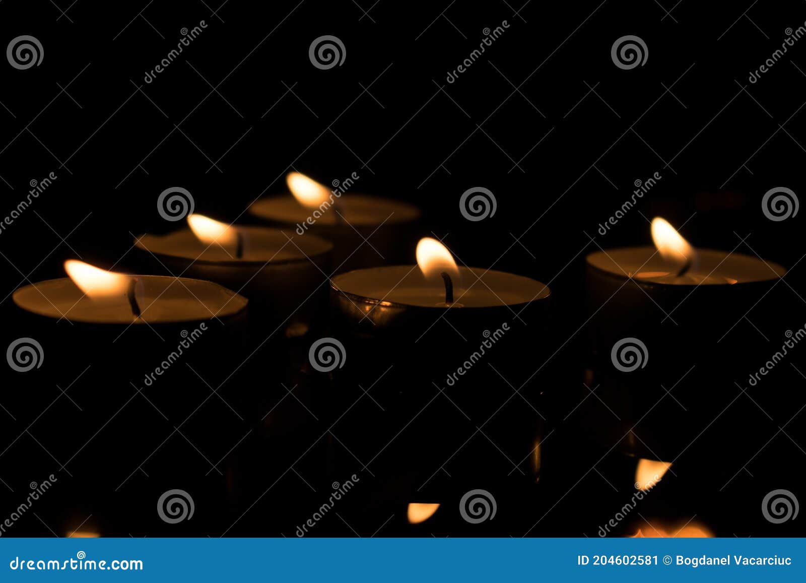 Candlelight. Many Candle Flames Glowing on Dark Stock Image - Image of ...