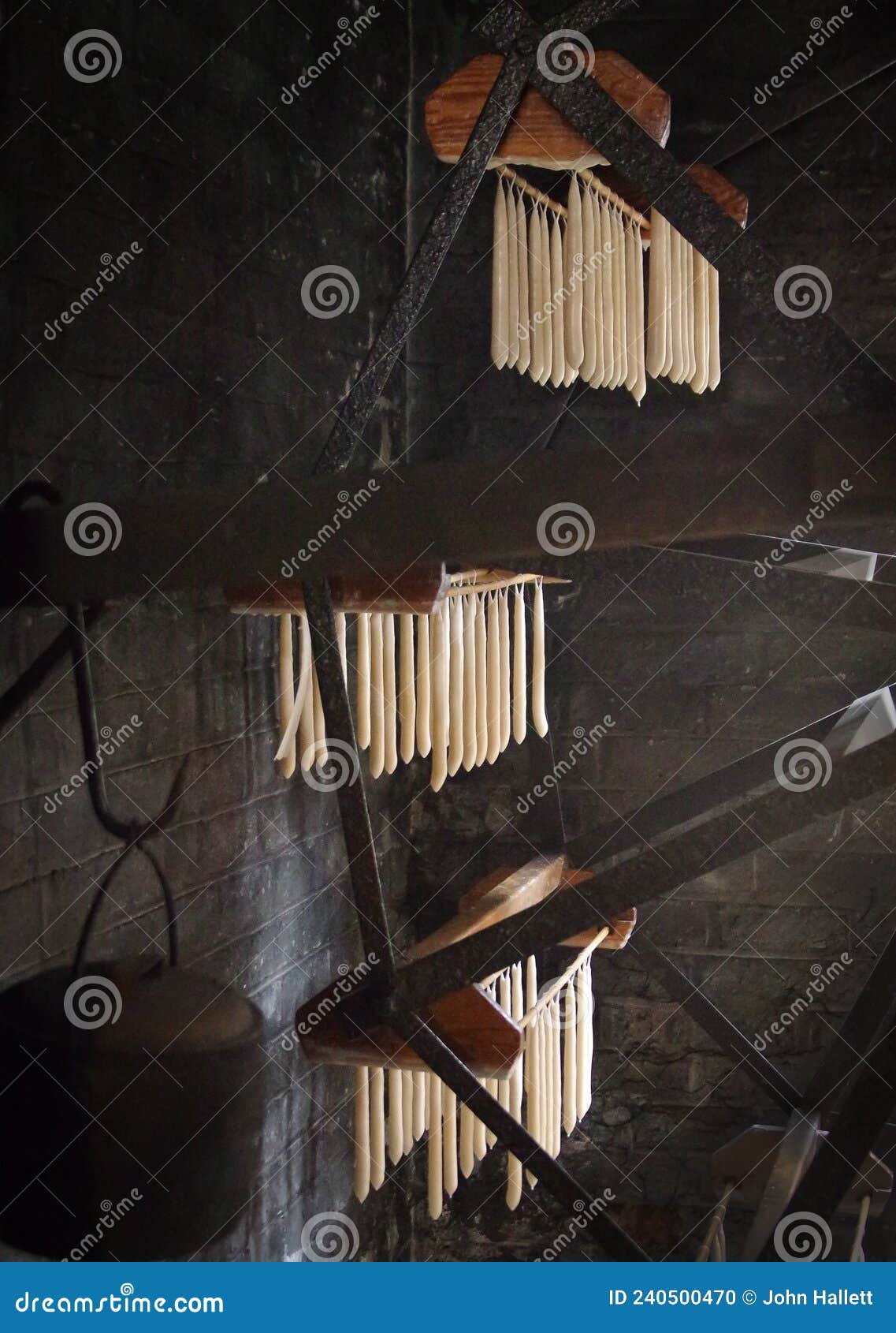 Candles Hanging on a Dipping Rack Stock Photo - Image of manufacture ...