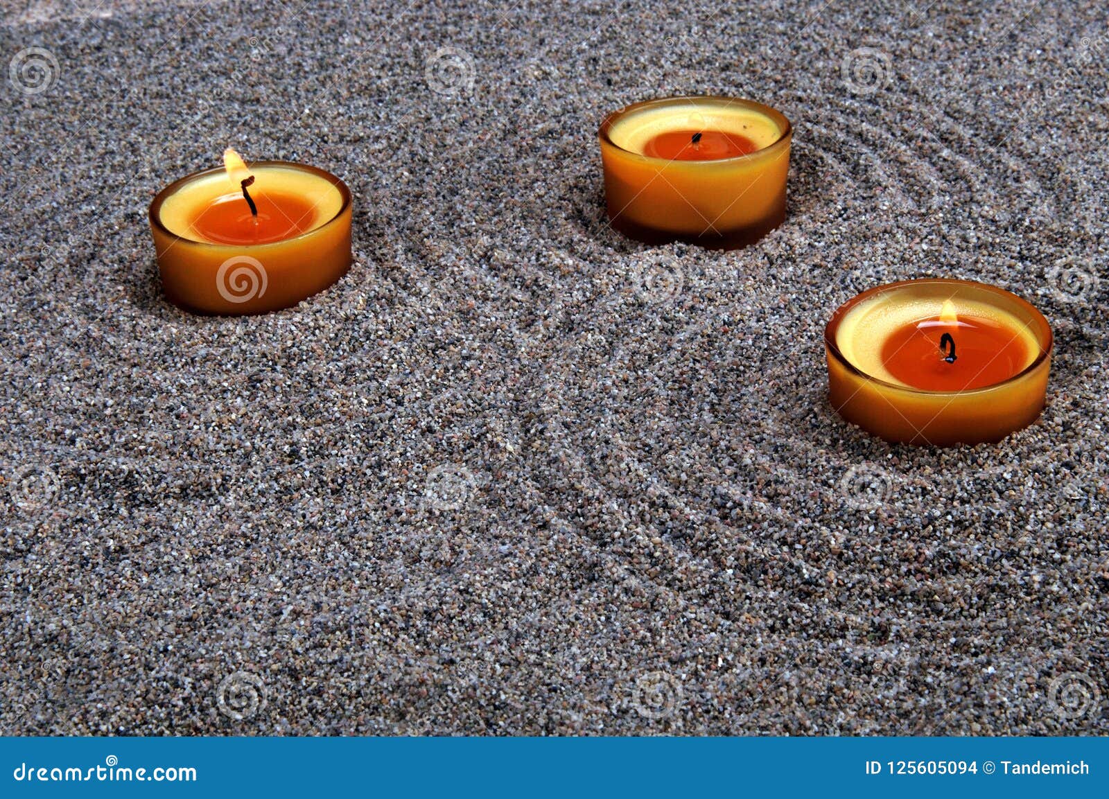 Candles in the Sand. Calming Patterns on the Sand Stock Photo - Image ...