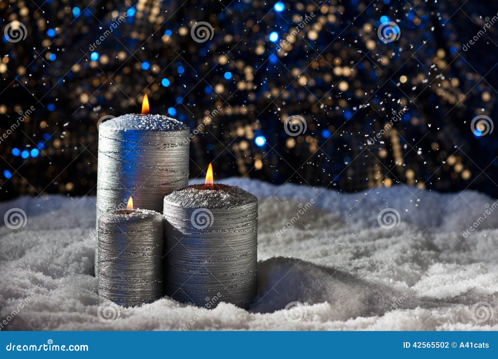 Candles in snow stock photo. Image of illuminated, greeting - 42565502