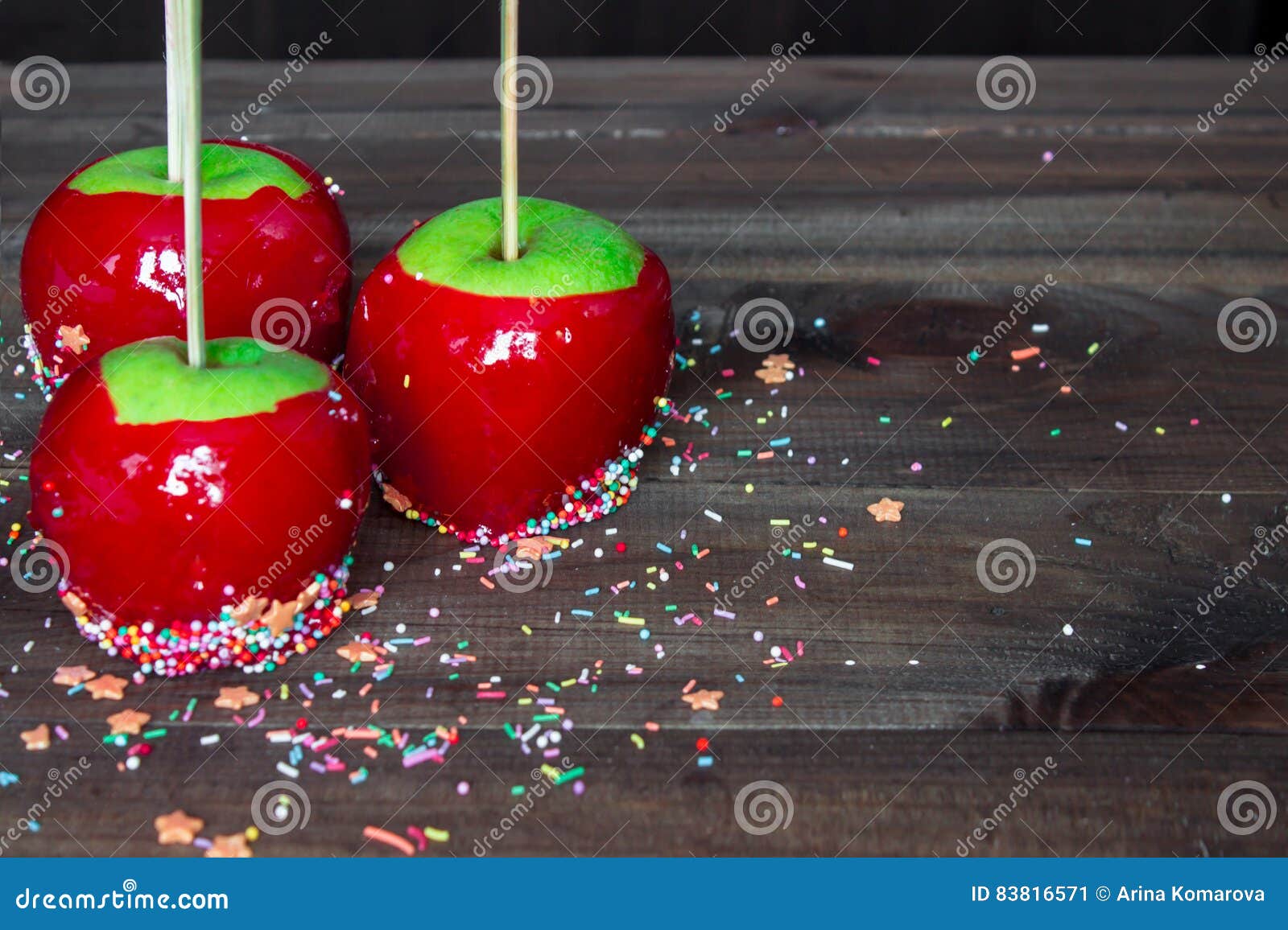 Candy Apples on Wooden Table Stock Image - Image of confectionery ...
