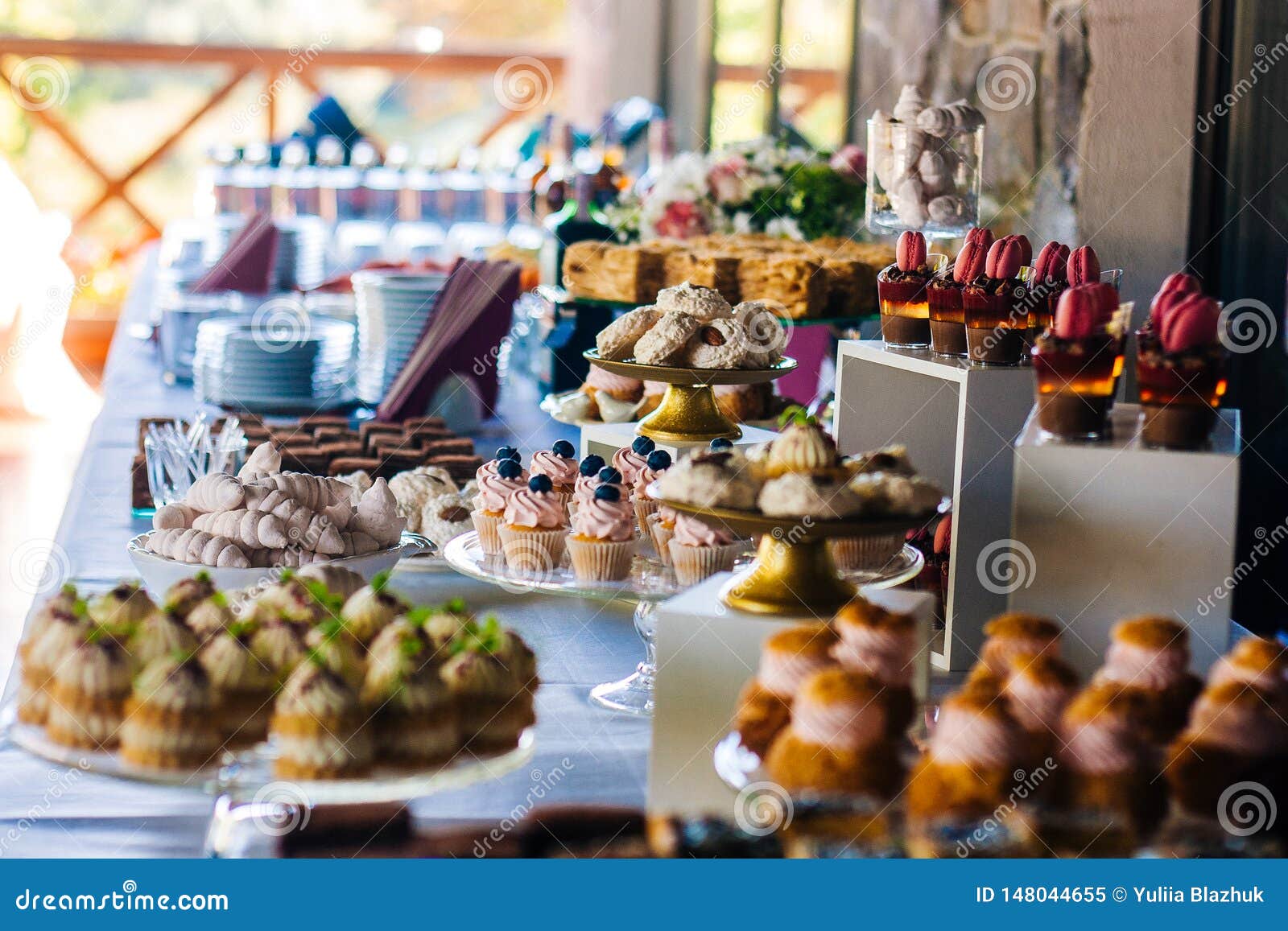 Candy Bar. Table with Different Cakes, Candies and Desserts for the ...