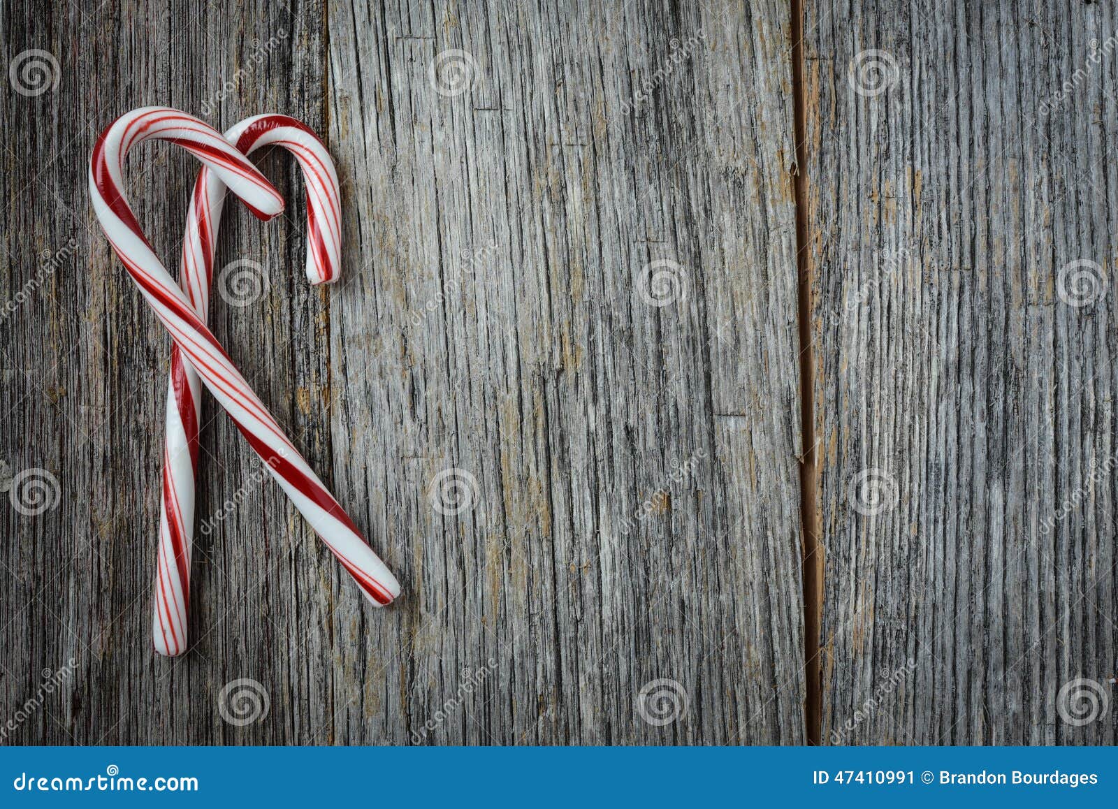 Candy Cane on Rustic Wood stock image. Image of candy - 47410991