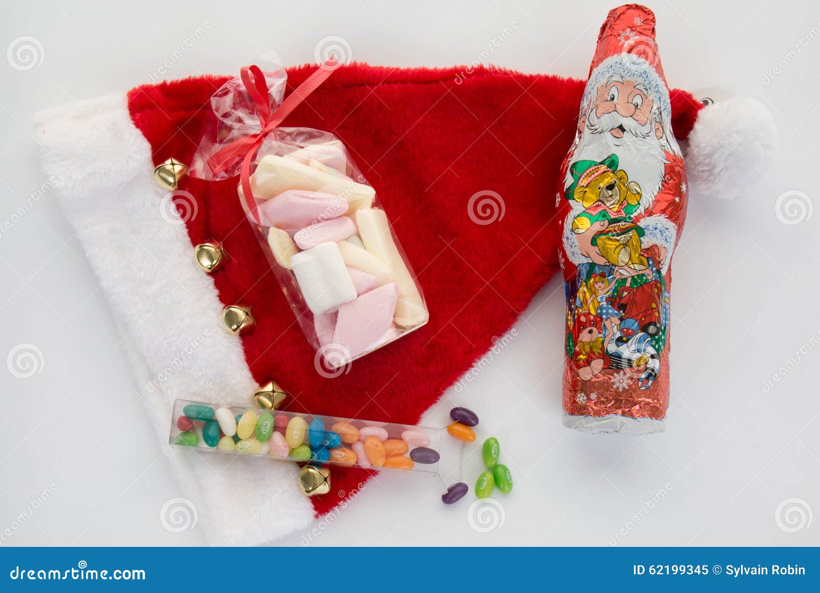 Candy Canes, Candies and Chocolate on Santa Hat Isolated Stock Image ...