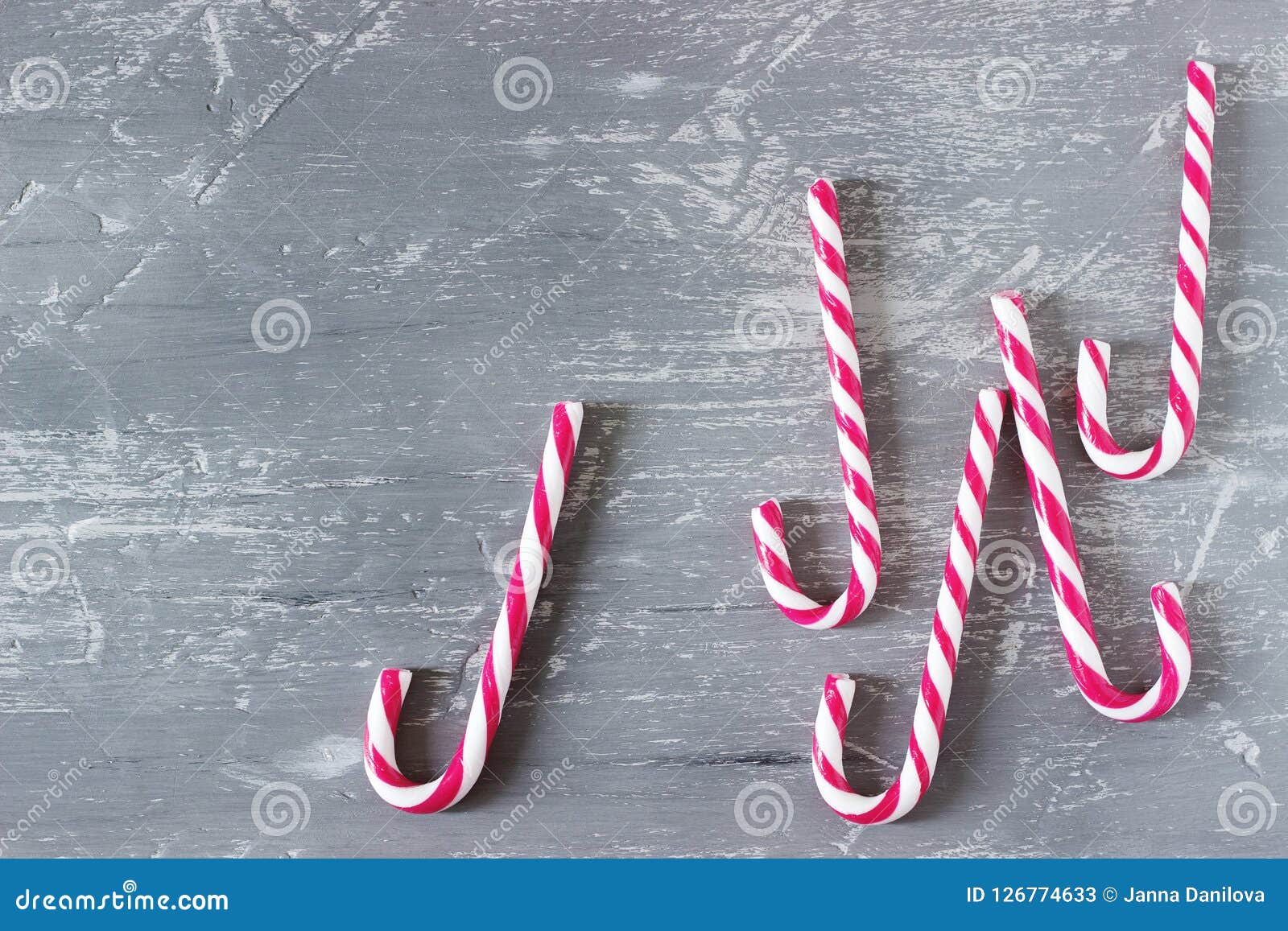 Candy Canes on a Gray Concrete Background, Christmas Concept with Place ...