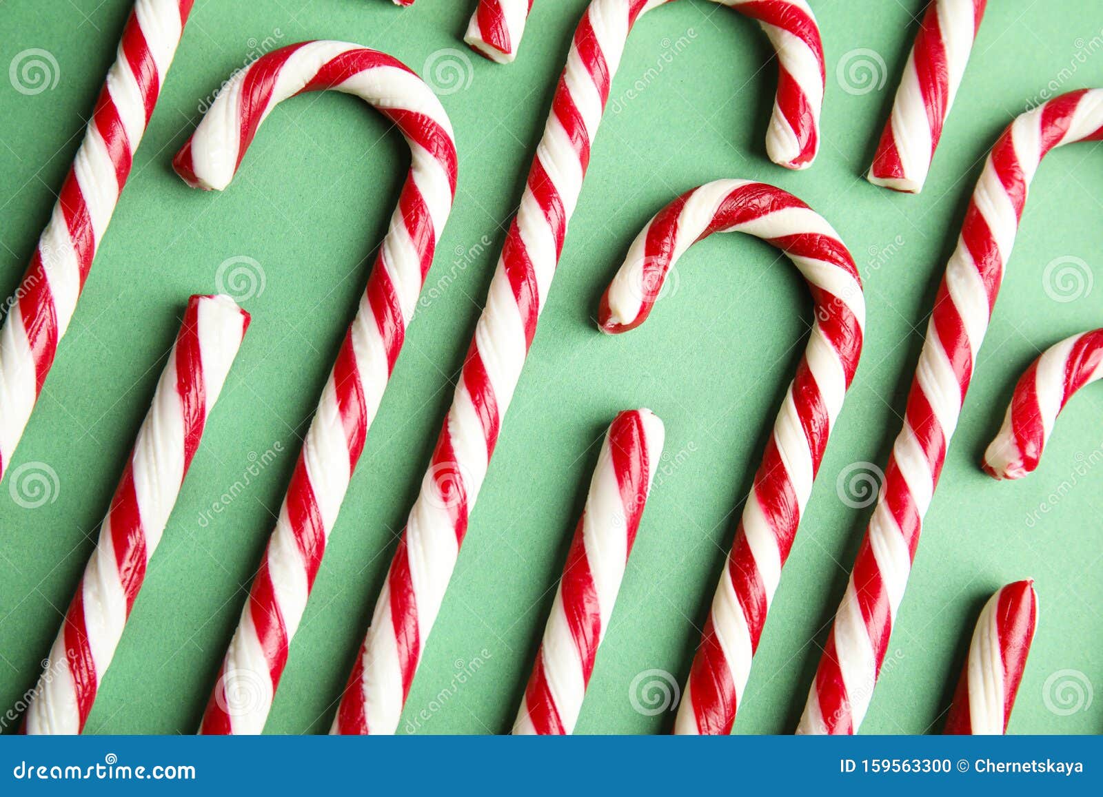 Candy Canes on Green Background Stock Photo - Image of candycane, event ...
