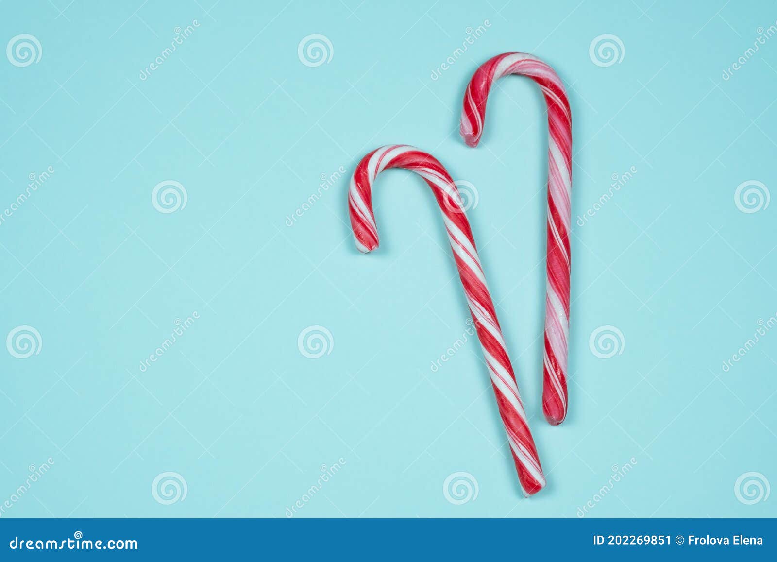 Candy Canes on a Light Blue Background Stock Image - Image of contrasts ...