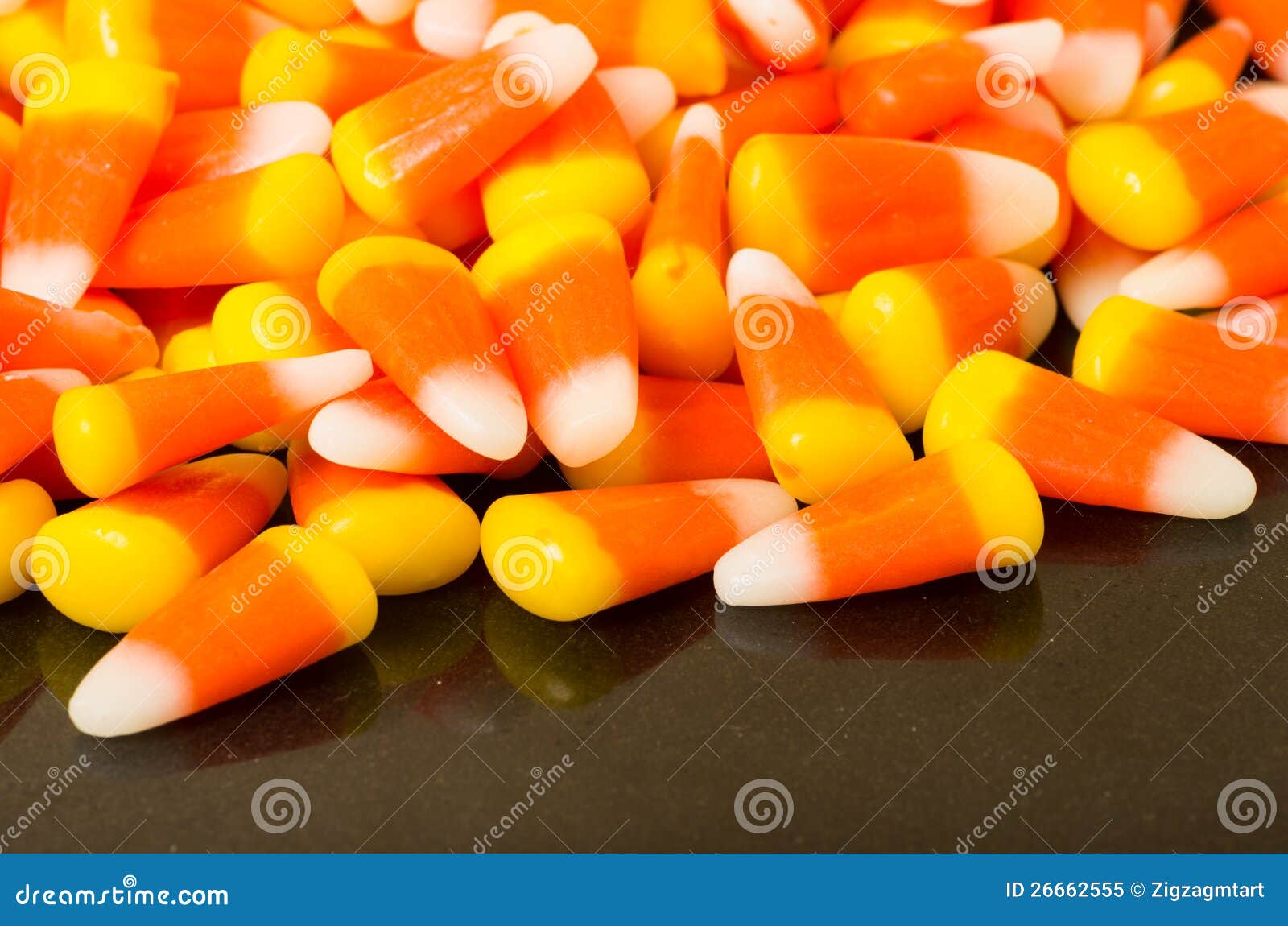 Candy corn on black table stock image. Image of festive - 26662555