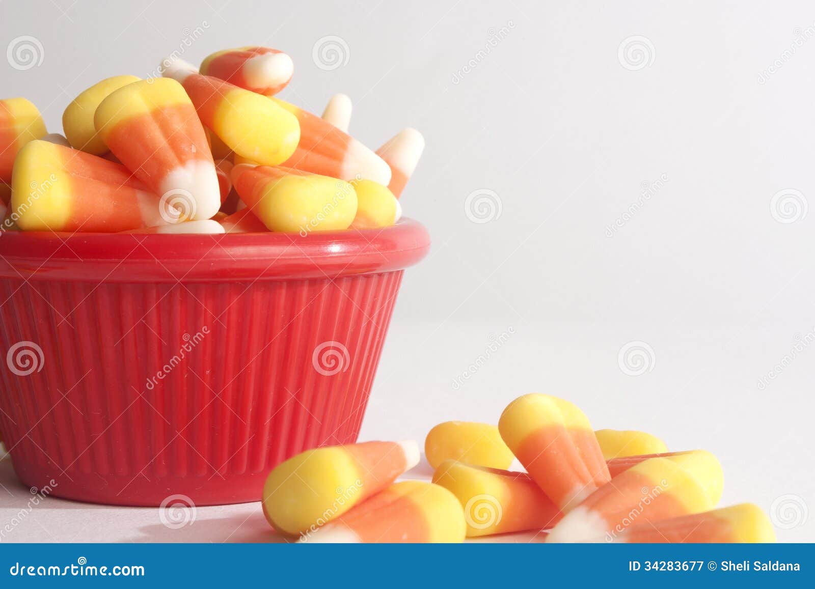 Candy Corn in a Red Bowl stock image. Image of white - 34283677
