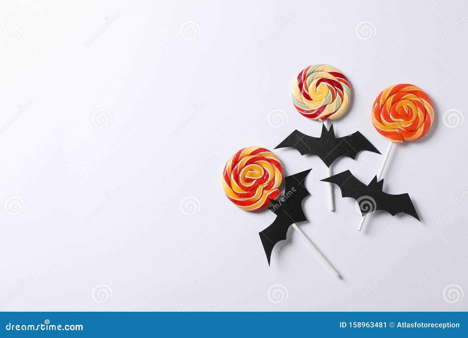 Candy and Decorative Bats on White Background Stock Image - Image of ...