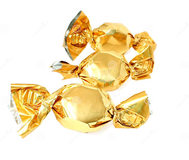 Candy in golden foil stock photo. Image of confectionery - 12612594