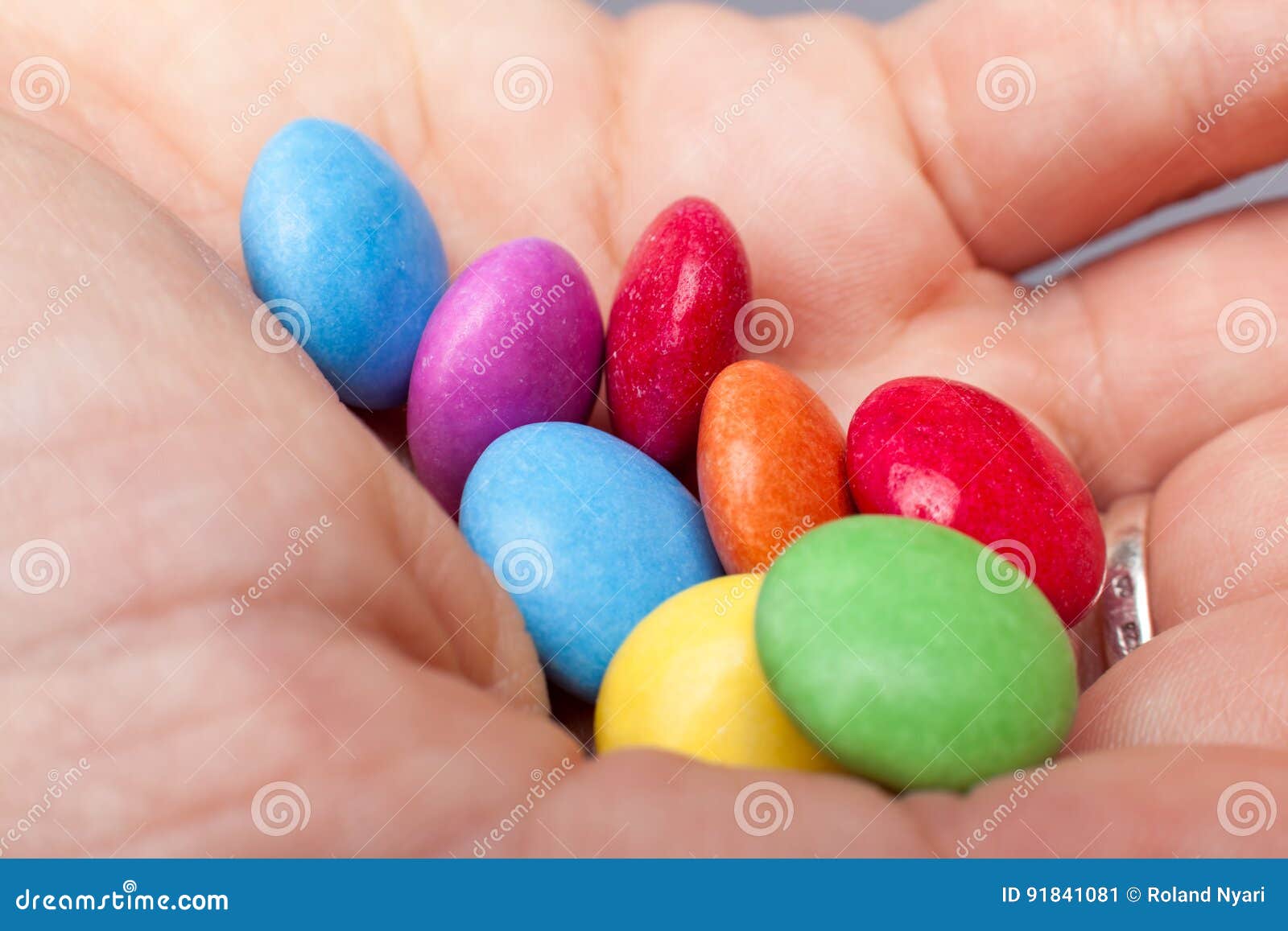 Candy in hand stock image. Image of kitchen, colourful - 91841081