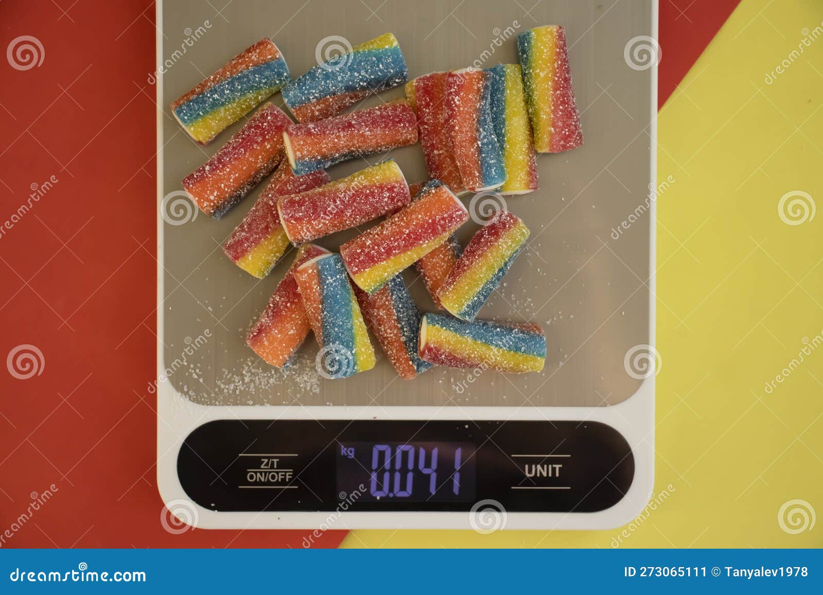 Candy , Kitchen Scales on a Colored Background Stock Image - Image of ...