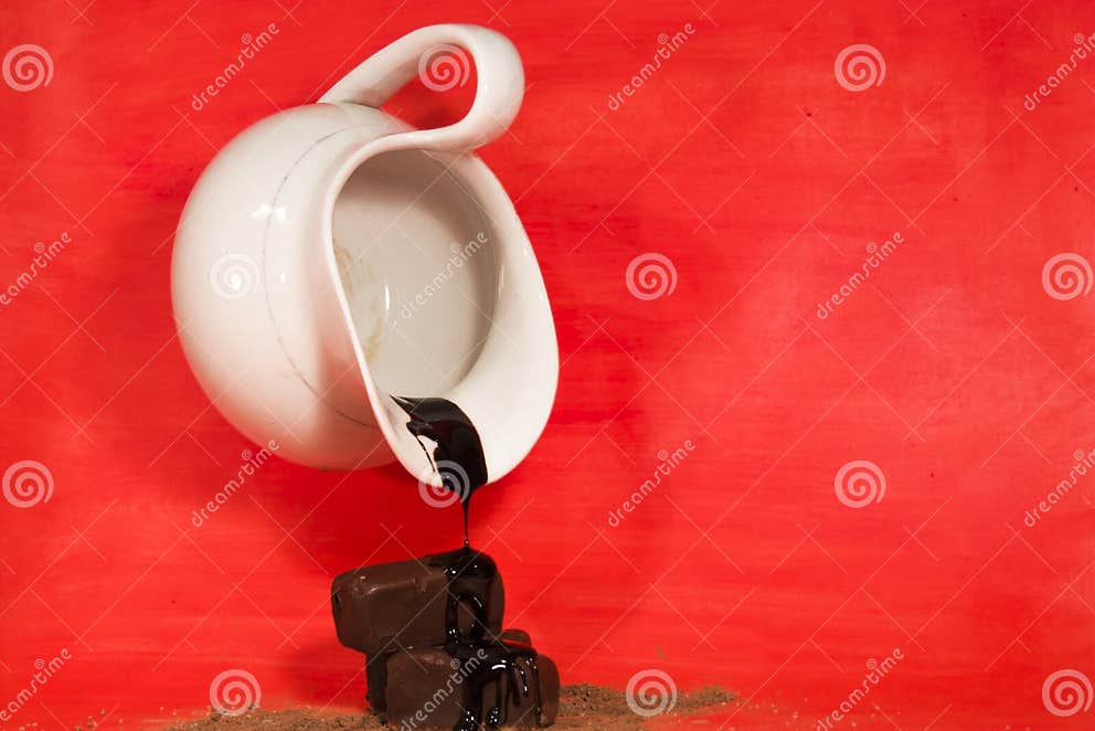 Candy Poured Chocolate from a White Pitcher on a Red Background 4 Stock ...