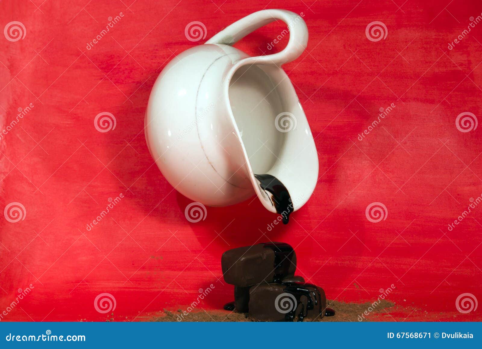 Candy Poured Chocolate from a White Pitcher on a Red Background 3 Stock ...